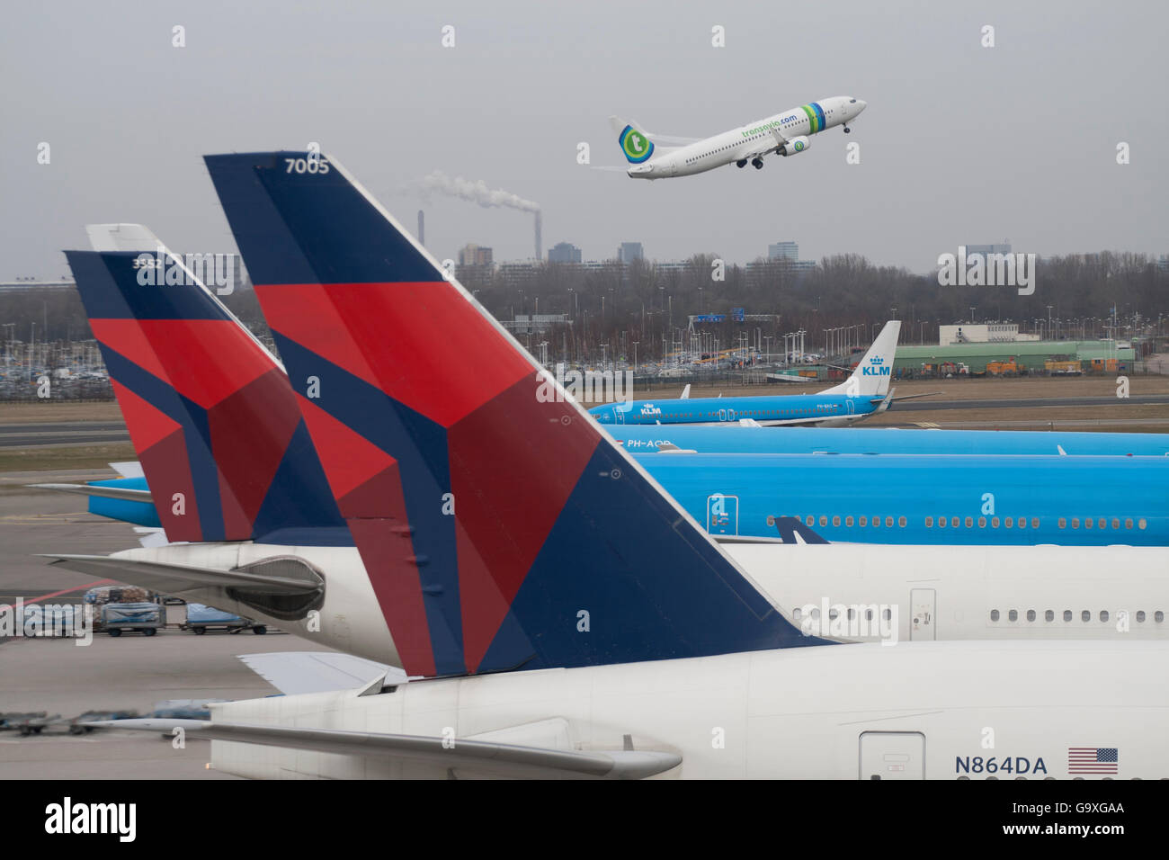 AMSTERDAM, MARCH 3 KLM and Delta airlines planes at Schiphol Airport ...
