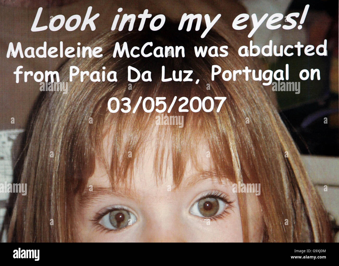 A poster showing missing girl madeleine mccann hi-res stock photography ...