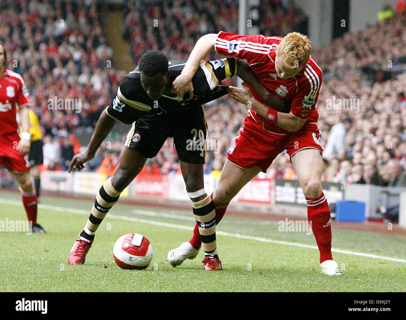 Liverpool's John Arne Riise and Charlton Athletic's Lloyd Sam battle ...