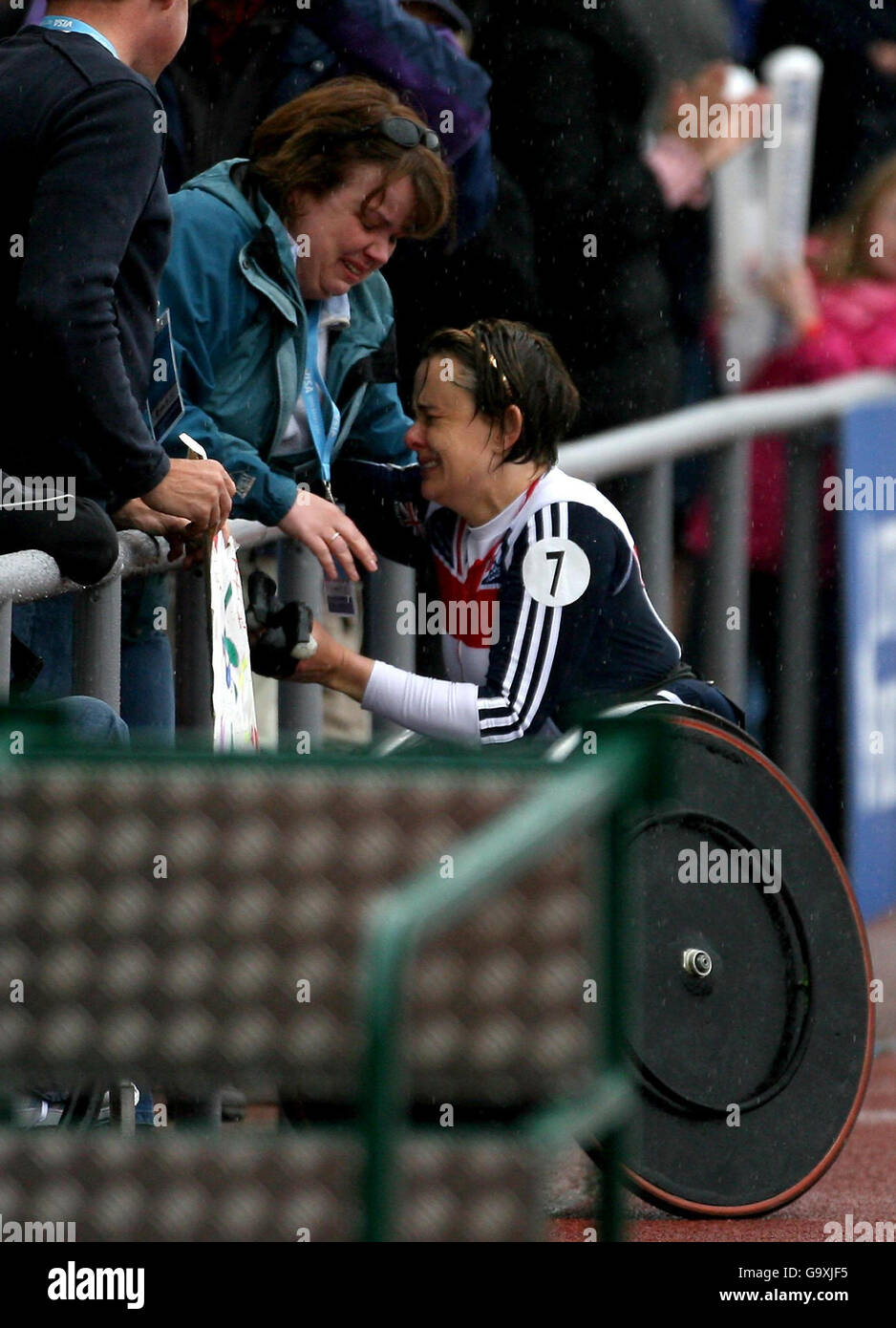 Great Britain's Tanni Grey-Thompson is consoled by friends and family ...