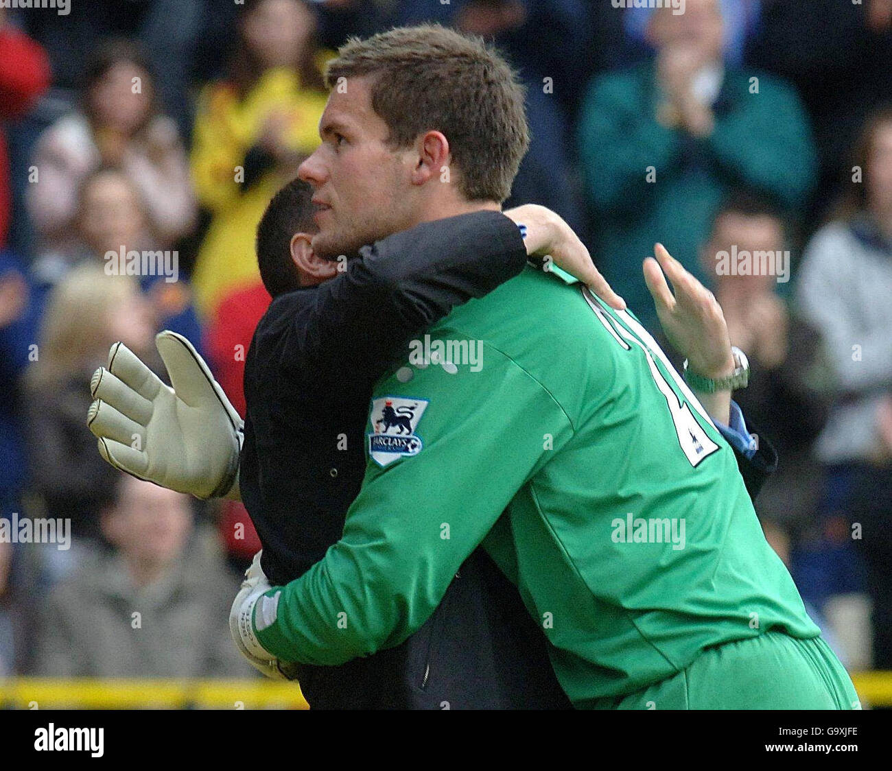 Watford goalkeeper Ben Foster (right) embarces manager Adrian Boothroyd ...