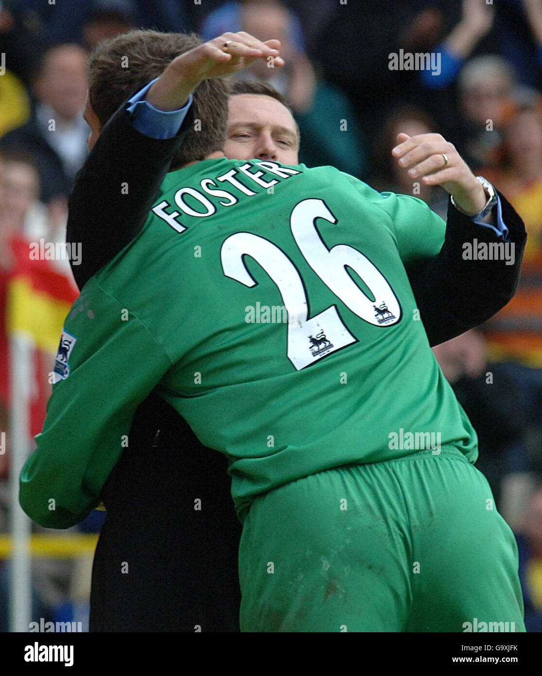 Watford goalkeeper Ben Foster embraces manager Adrian Boothroyd after ...
