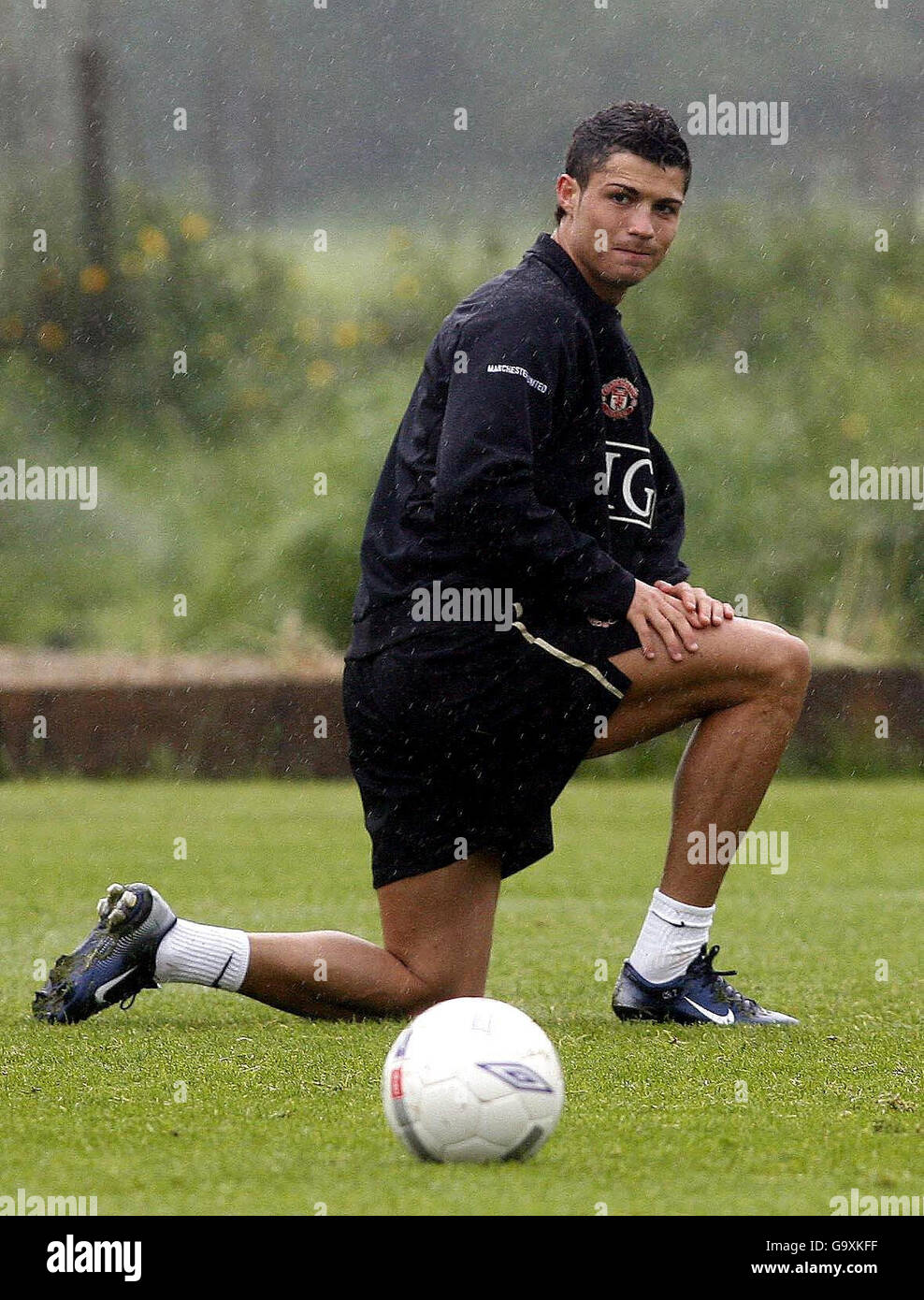 Manchester United's Cristiano Ronaldo stretches during a training ...