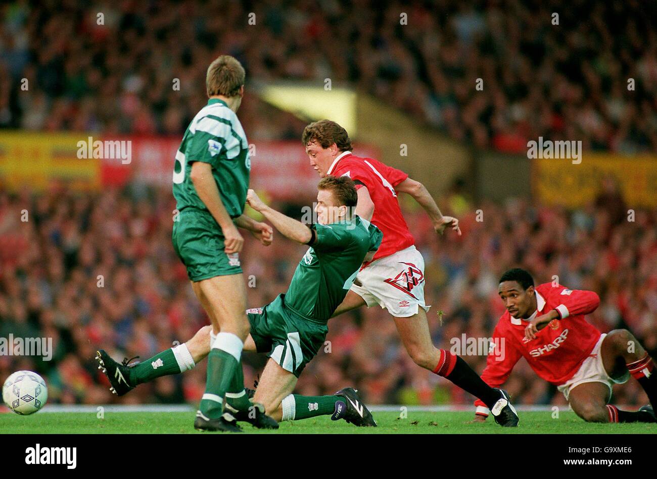 LIVERPOOL'S STEVE NICOL CLEARS FROM STEVE BRUCE. MANCHESTER UNITED V ...