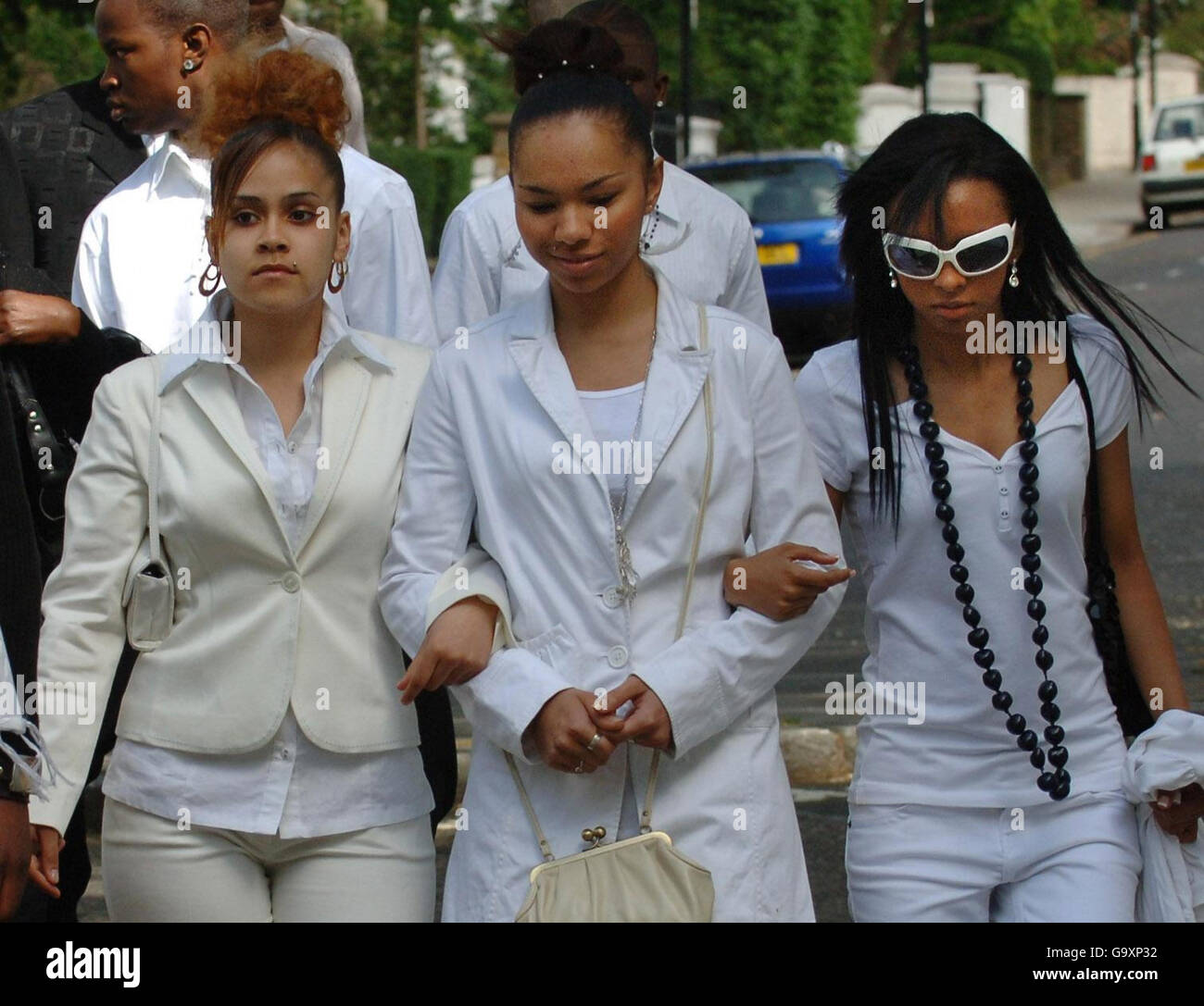 Mourners attending the funeral of the 16- year-old Kodjo Yenga, who ...