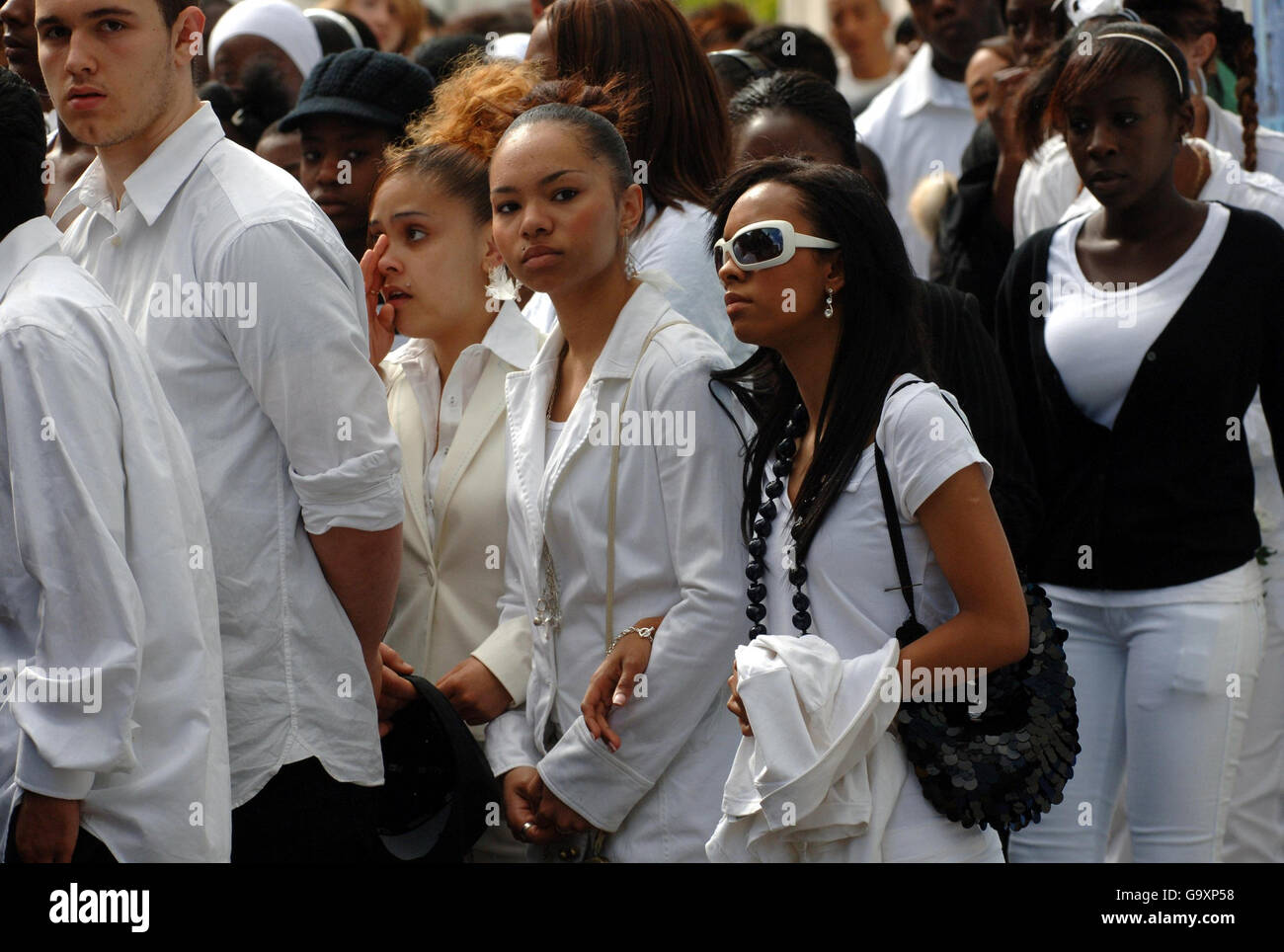 Mourners attending the funeral of the 16- year-old Kodjo Yenga, who ...