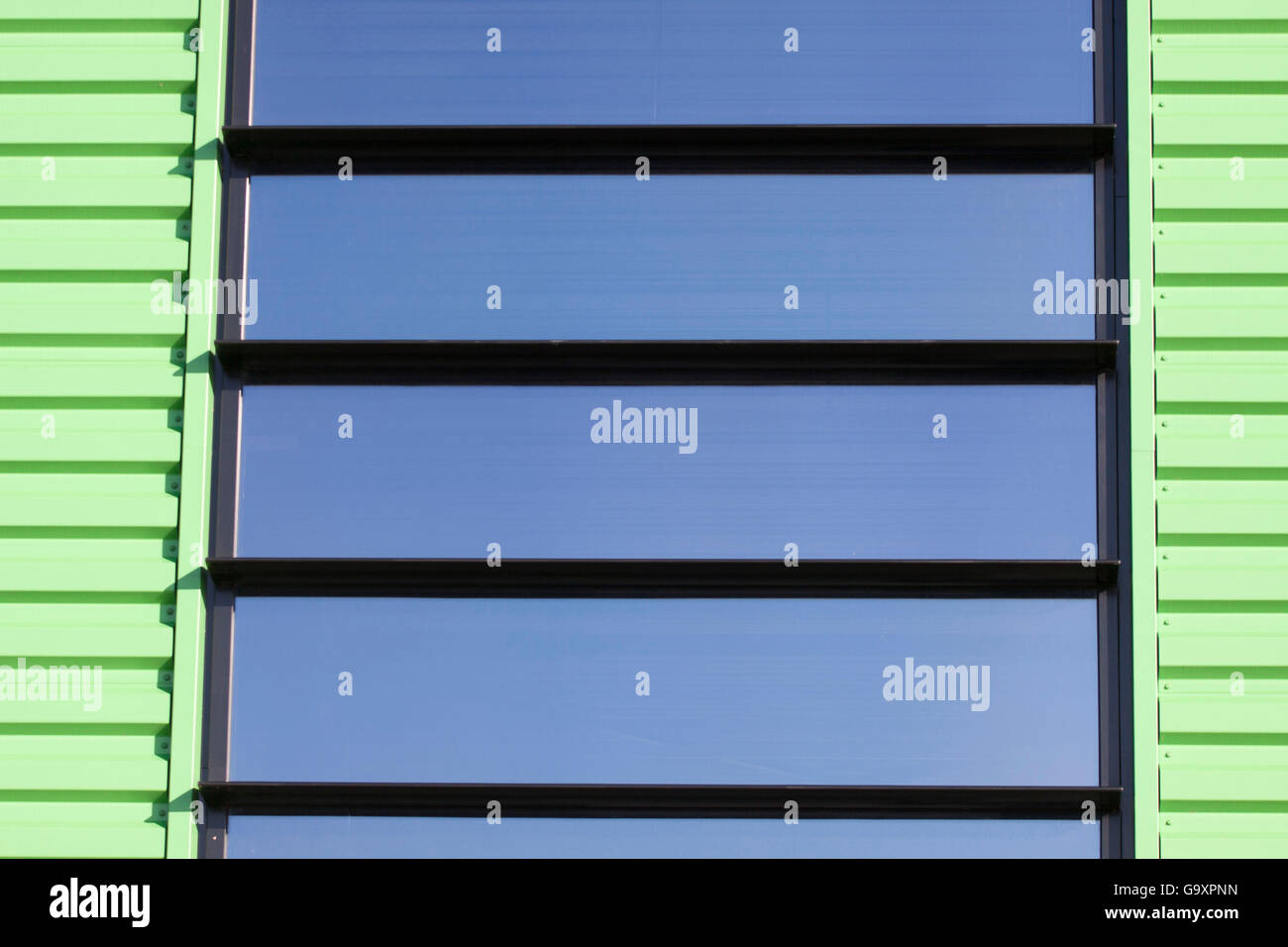 Corrugated metal roof, and windows Stock Photo - Alamy