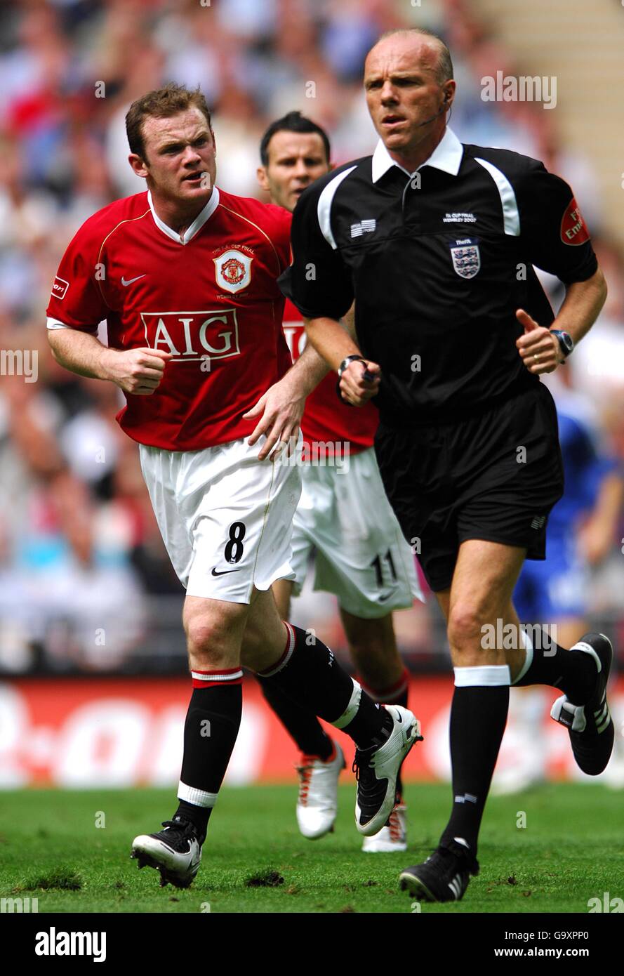 Manchester United's Wayne Rooney vents his frustration at referee Steve ...