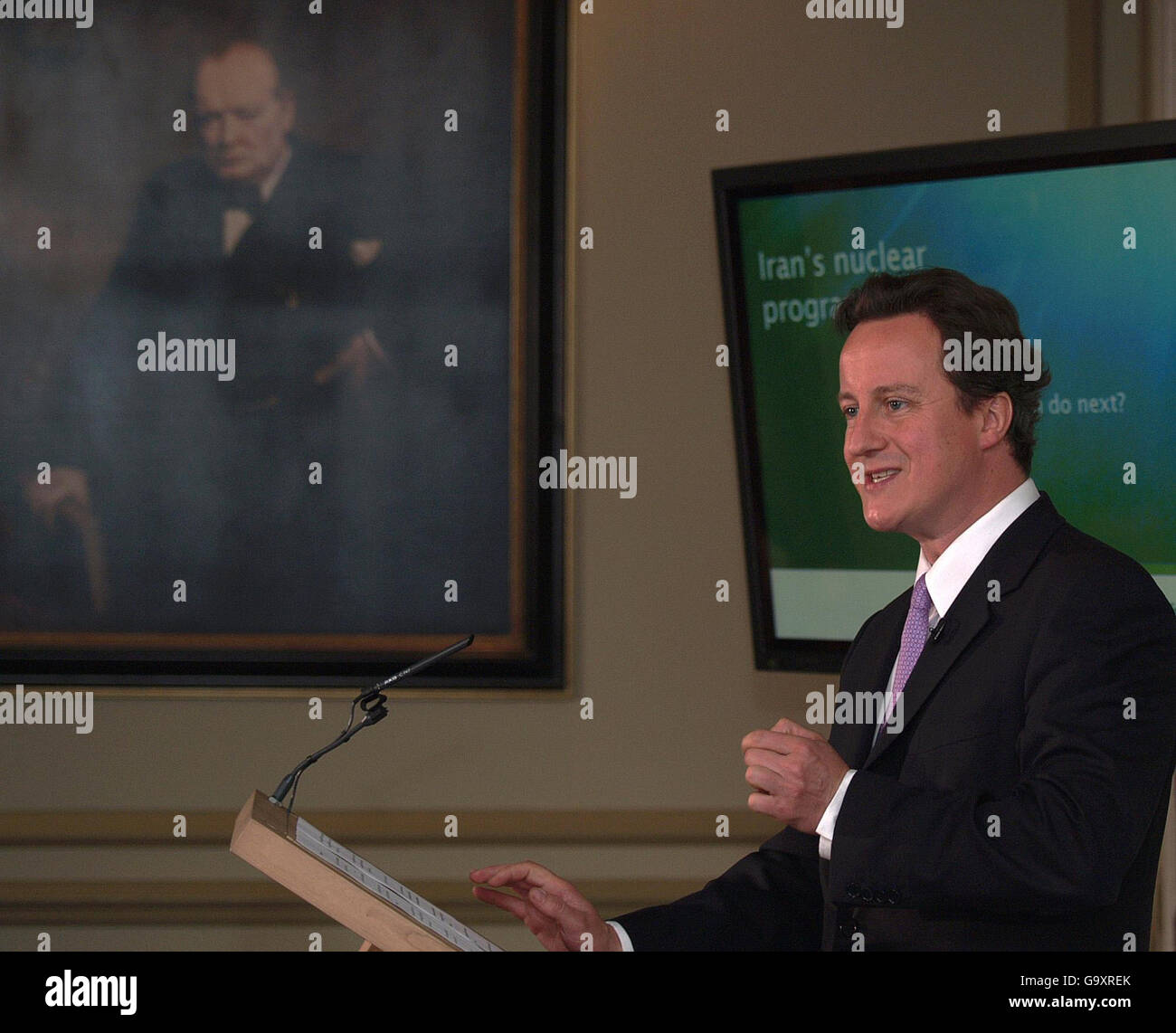 Half length mid top smiling speaking lectern mike mic microphone hi-res ...