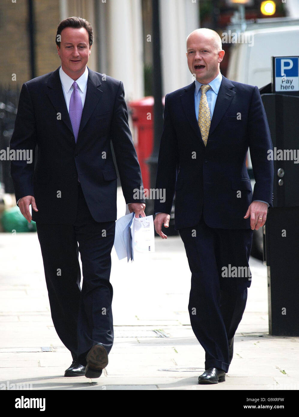 David Cameron walks with William Haig, his shadow Foreign Secretary ...