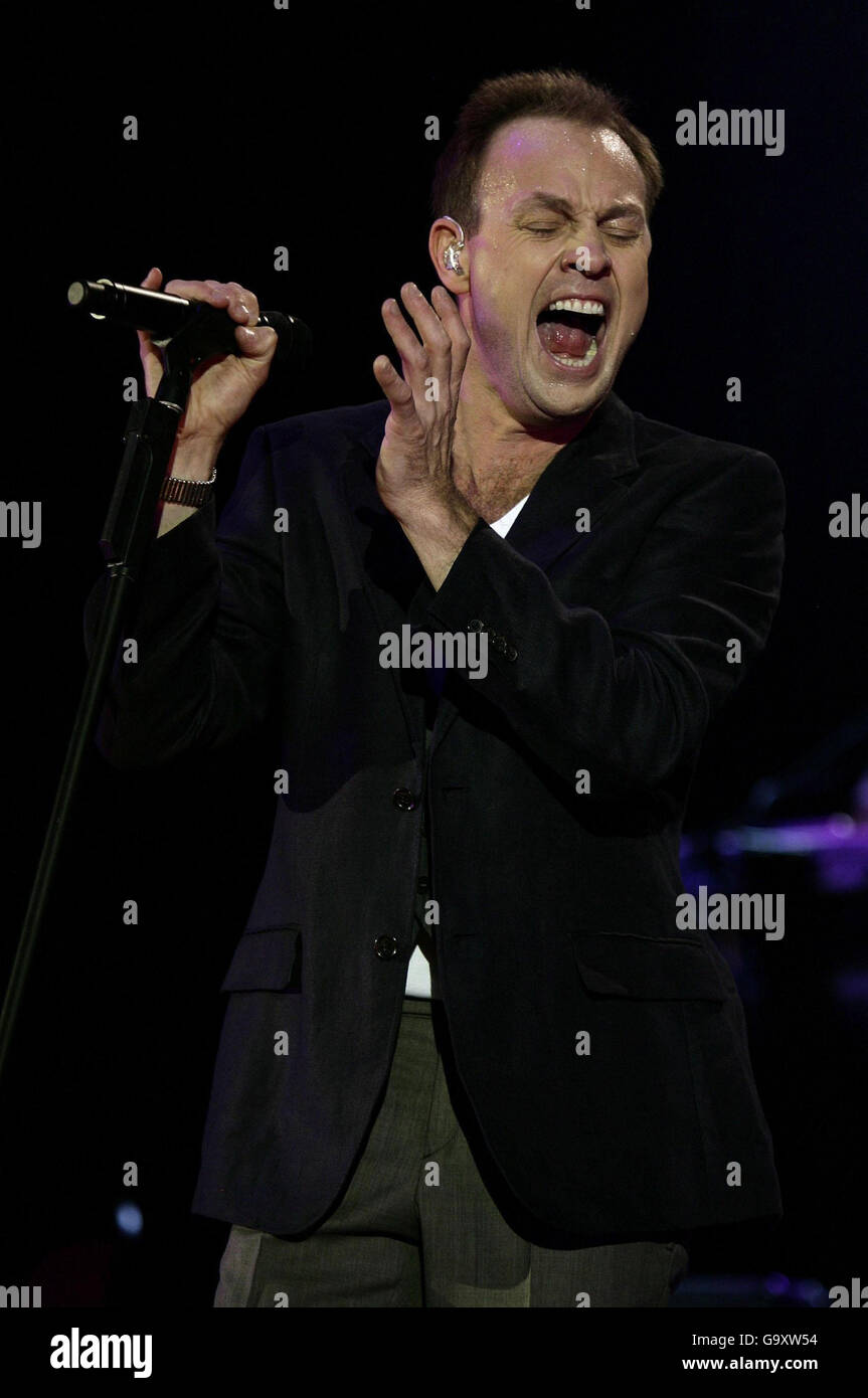 Jason Donovan performing on stage at the Hammersmith Apollo in west ...
