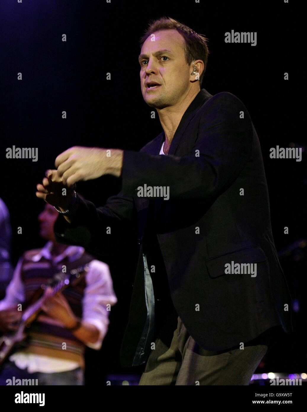 Jason Donovan performing on stage at the Hammersmith Apollo in west ...