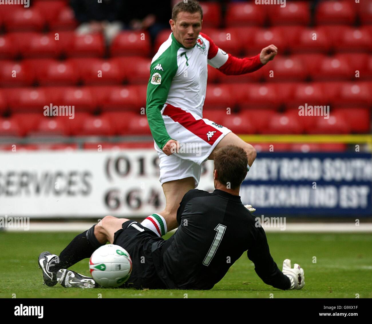 Wales's Craig Bellamy breaks through the New Zealand defence and tries ...