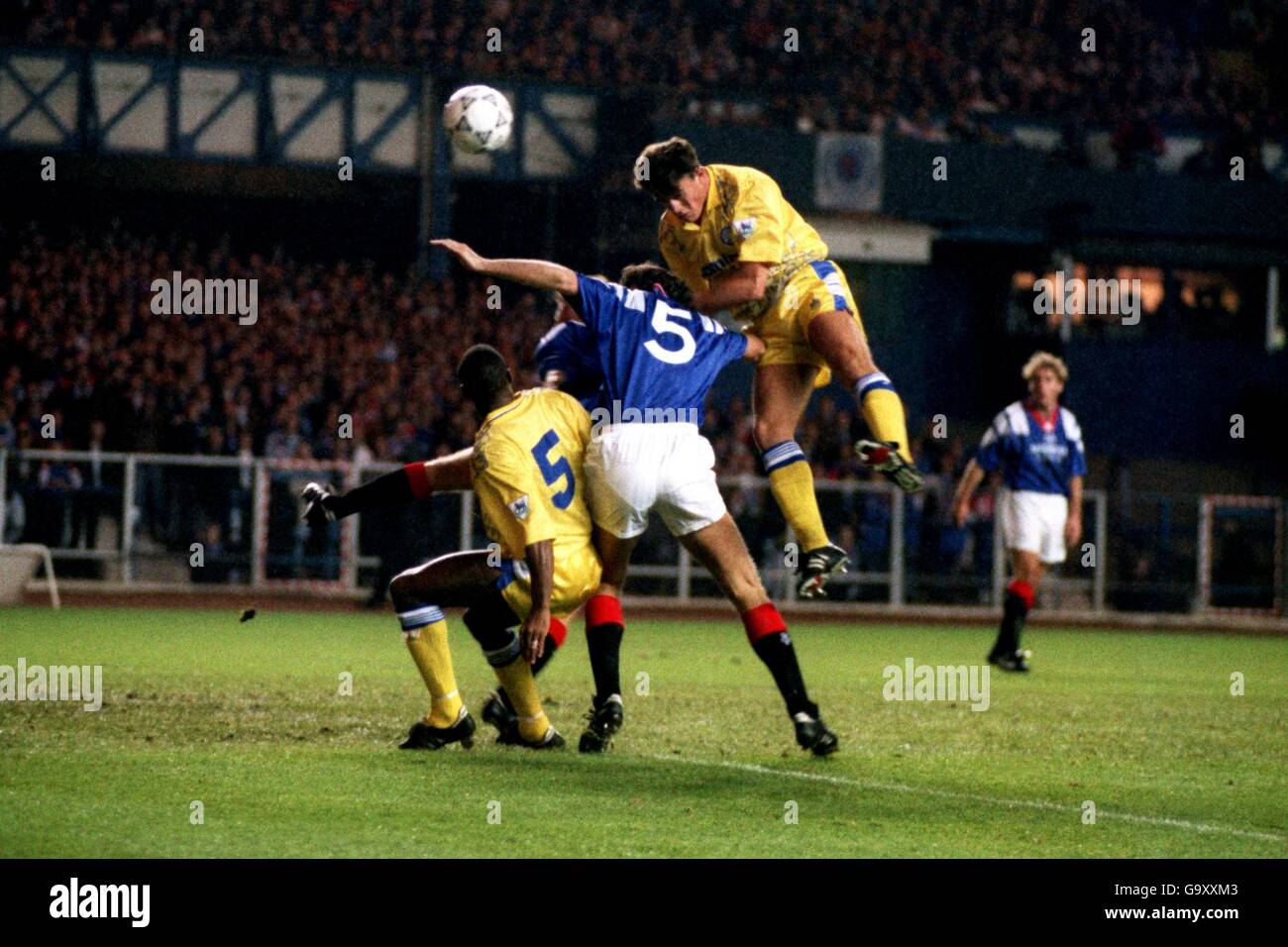 JON NEWSOME - LEEDS UNITED OUTJUMPS DAVID McPHERSON OF GLASGOW RANGERS ...