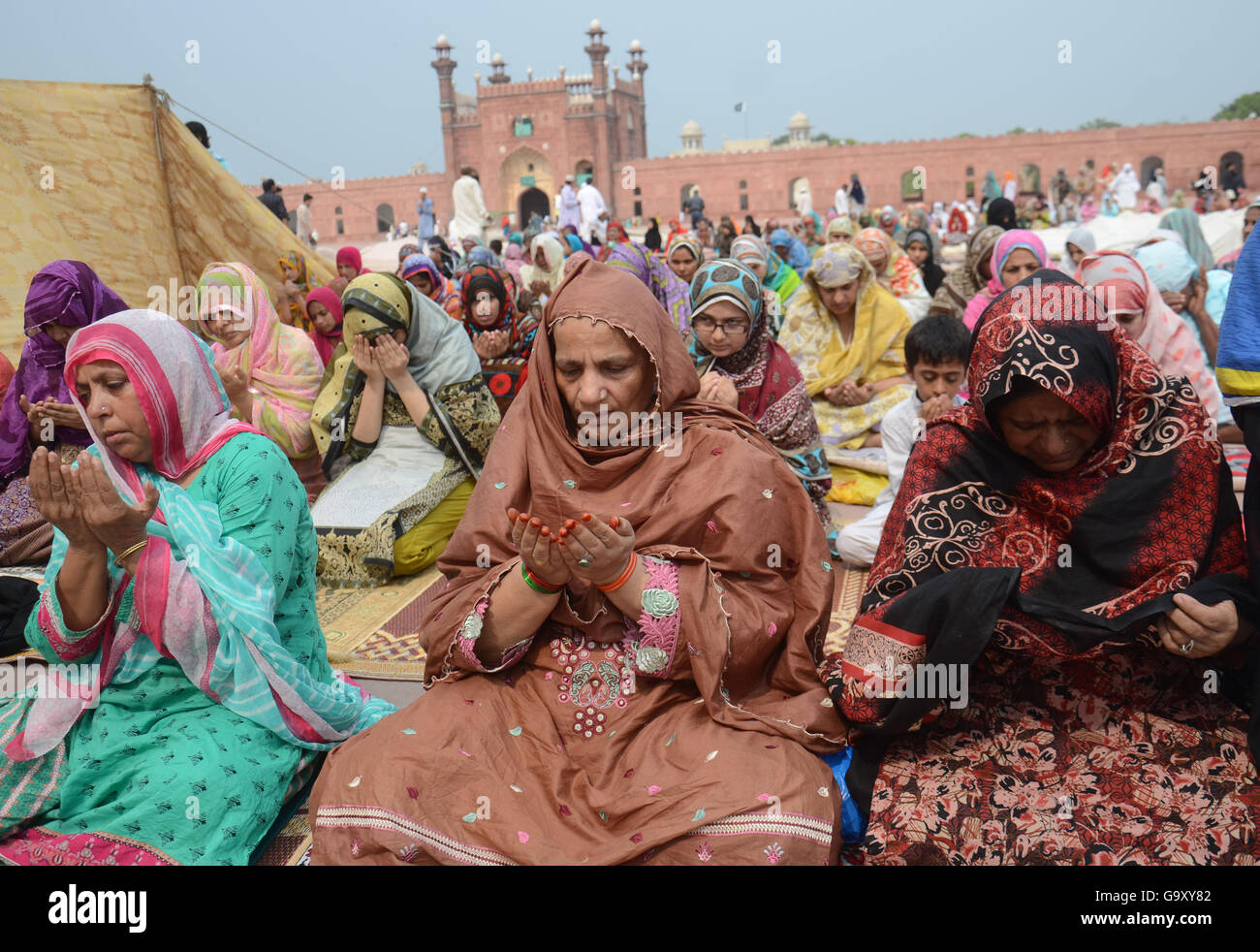 Lahore, Pakistan. 01st July, 2016. Pakistani faithful Muslims takes a ...