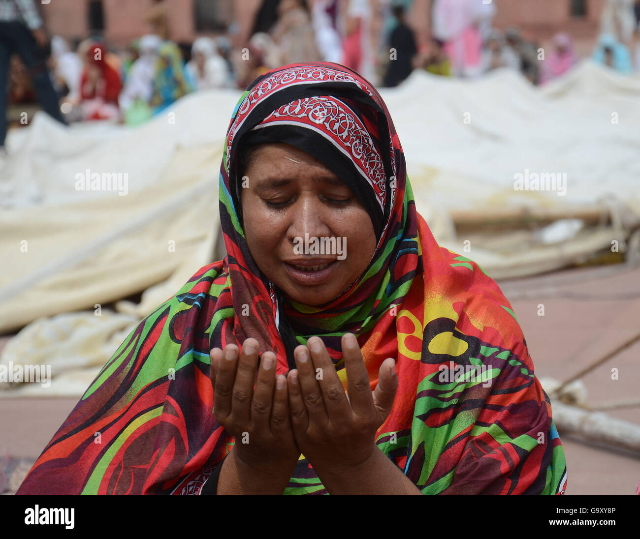 Lahore, Pakistan. 01st July, 2016. Pakistani faithful Muslims takes a ...