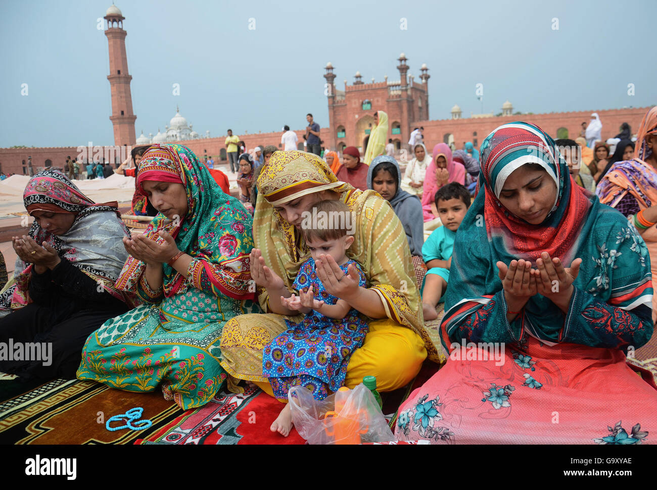 Lahore, Pakistan. 01st July, 2016. Pakistani faithful Muslims takes a ...
