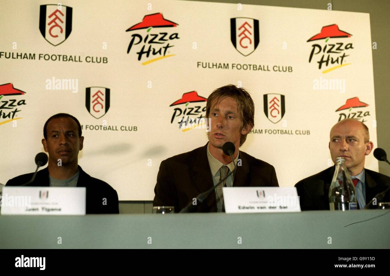 Fulham's new signing, Dutch goalkeeper Edwin Van Der Sar (c), sits with ...