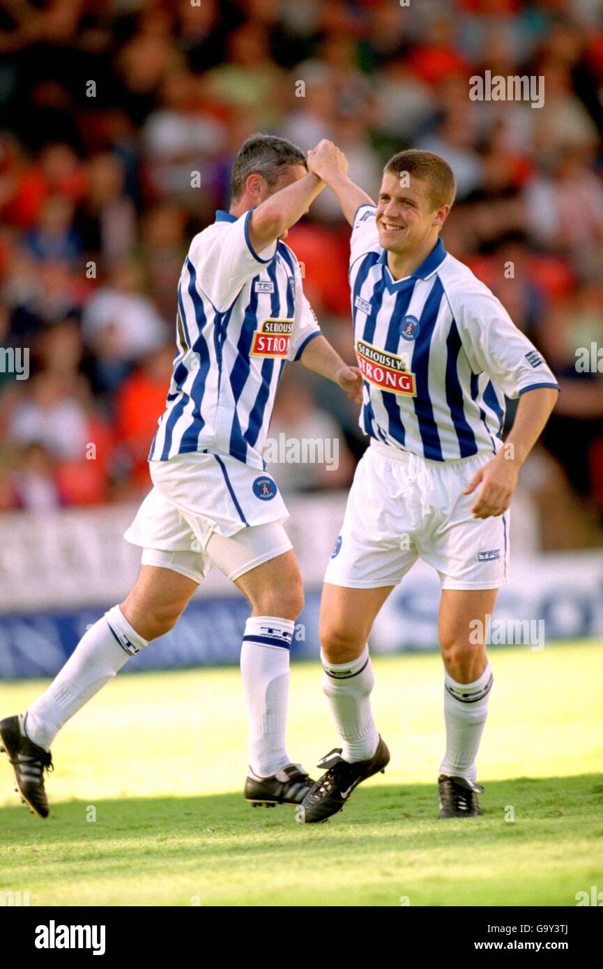 Kilmarnock's Chris Innes (r) congratulates teammate Andy McLaren (l) on ...