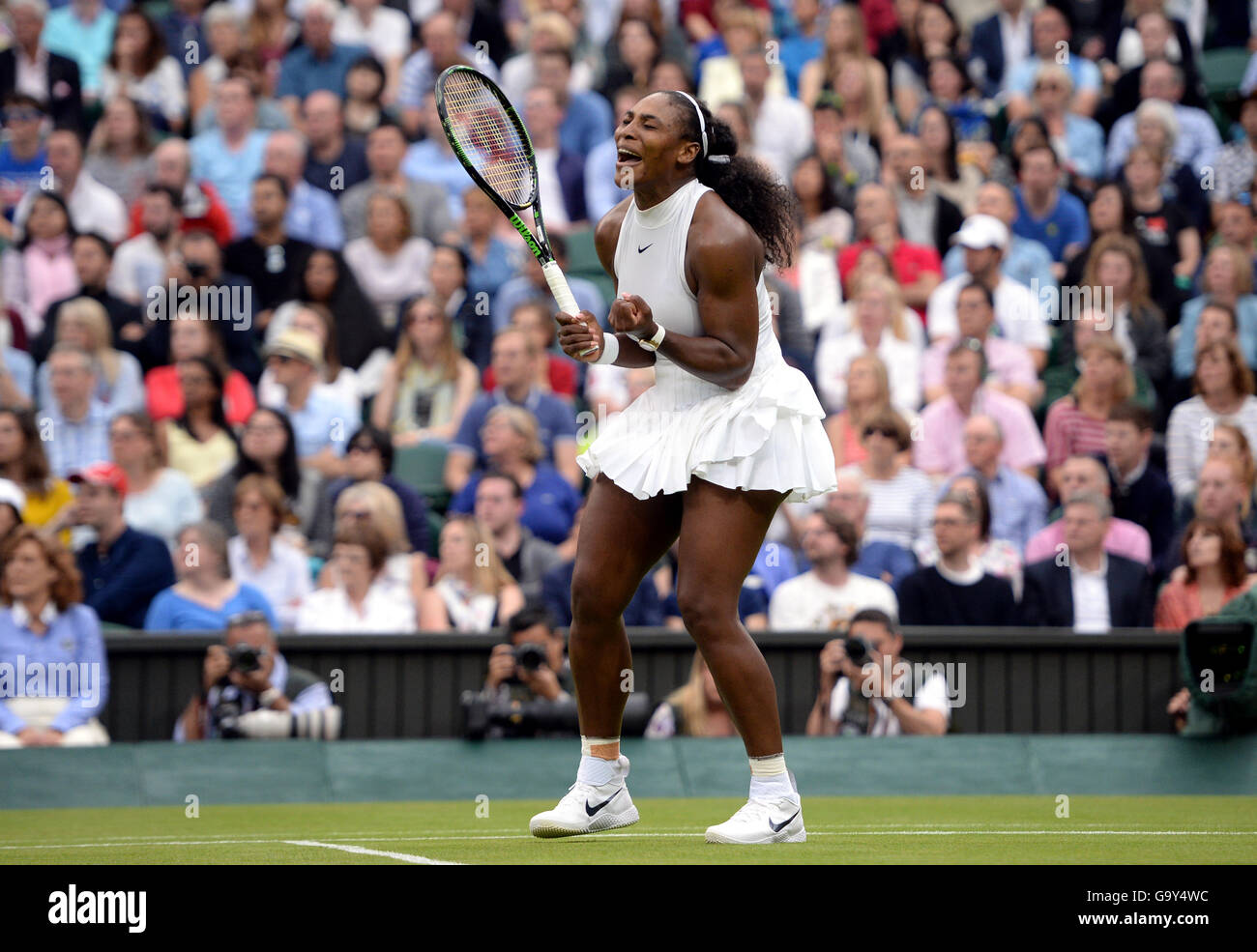Serena Williams reacts during her match against Christina McHale on day ...