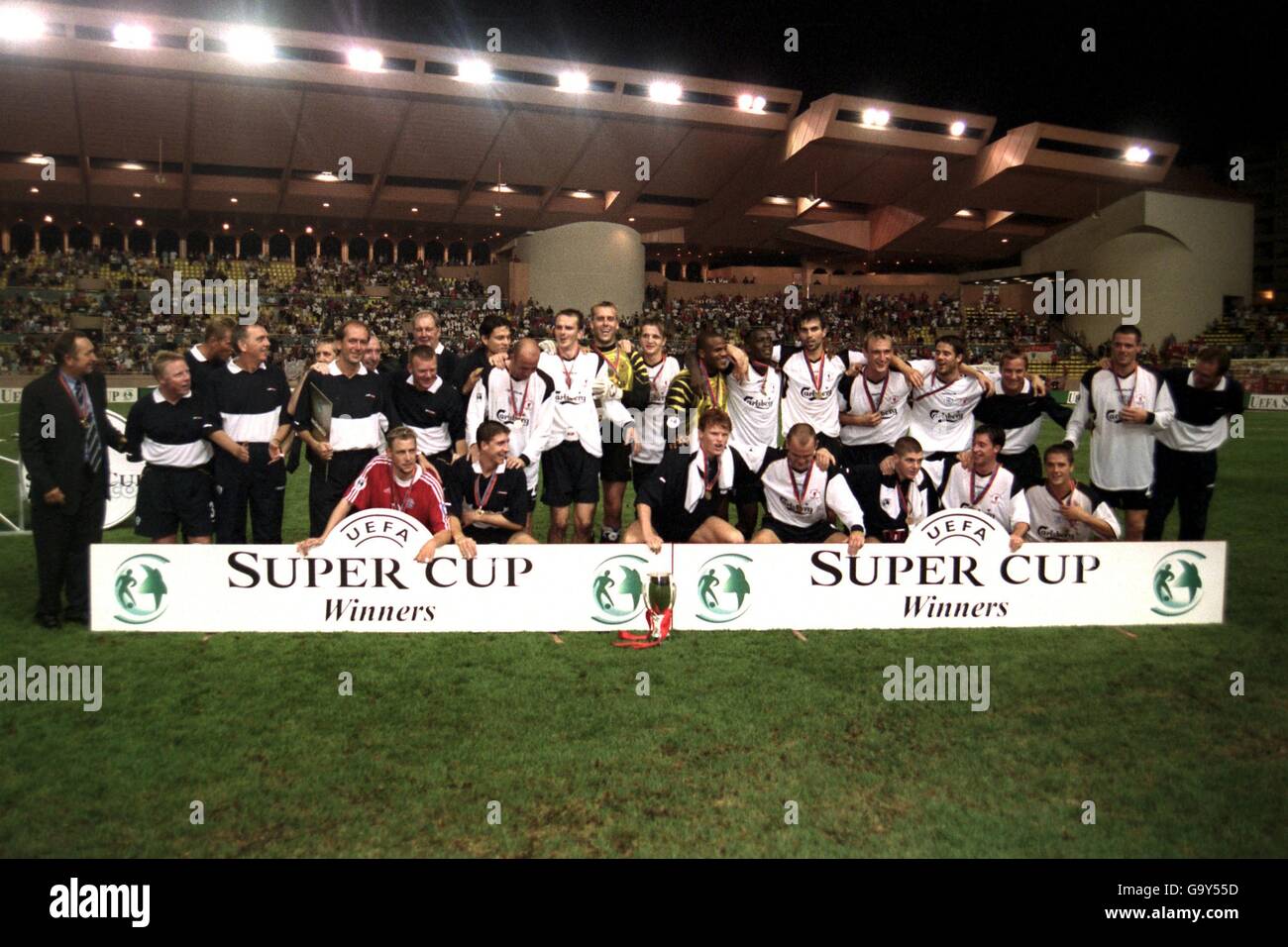 The liverpool team celebrate winning the uefa cup hi-res stock ...