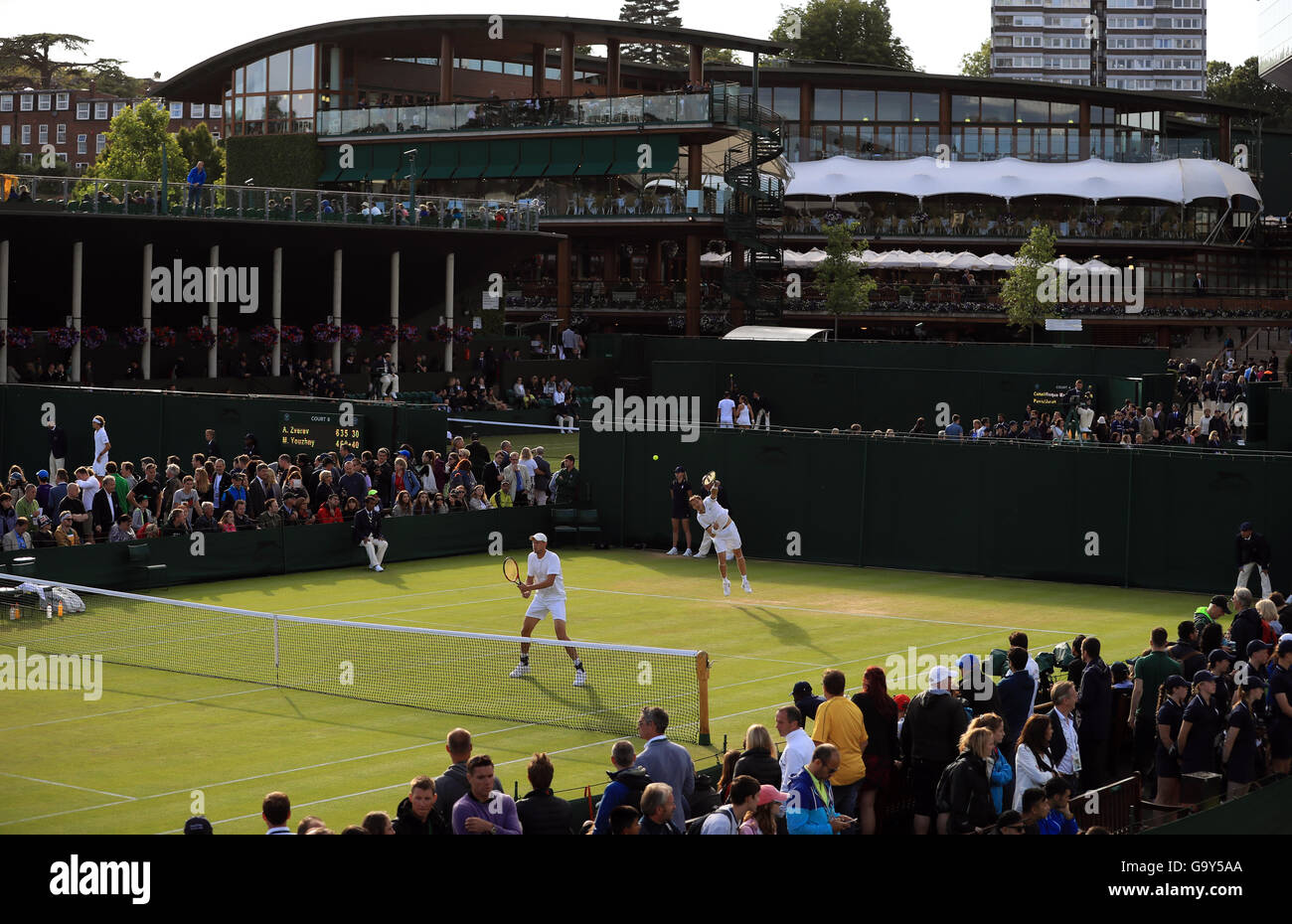 Double action on court nine on day Five of the Wimbledon Championships ...