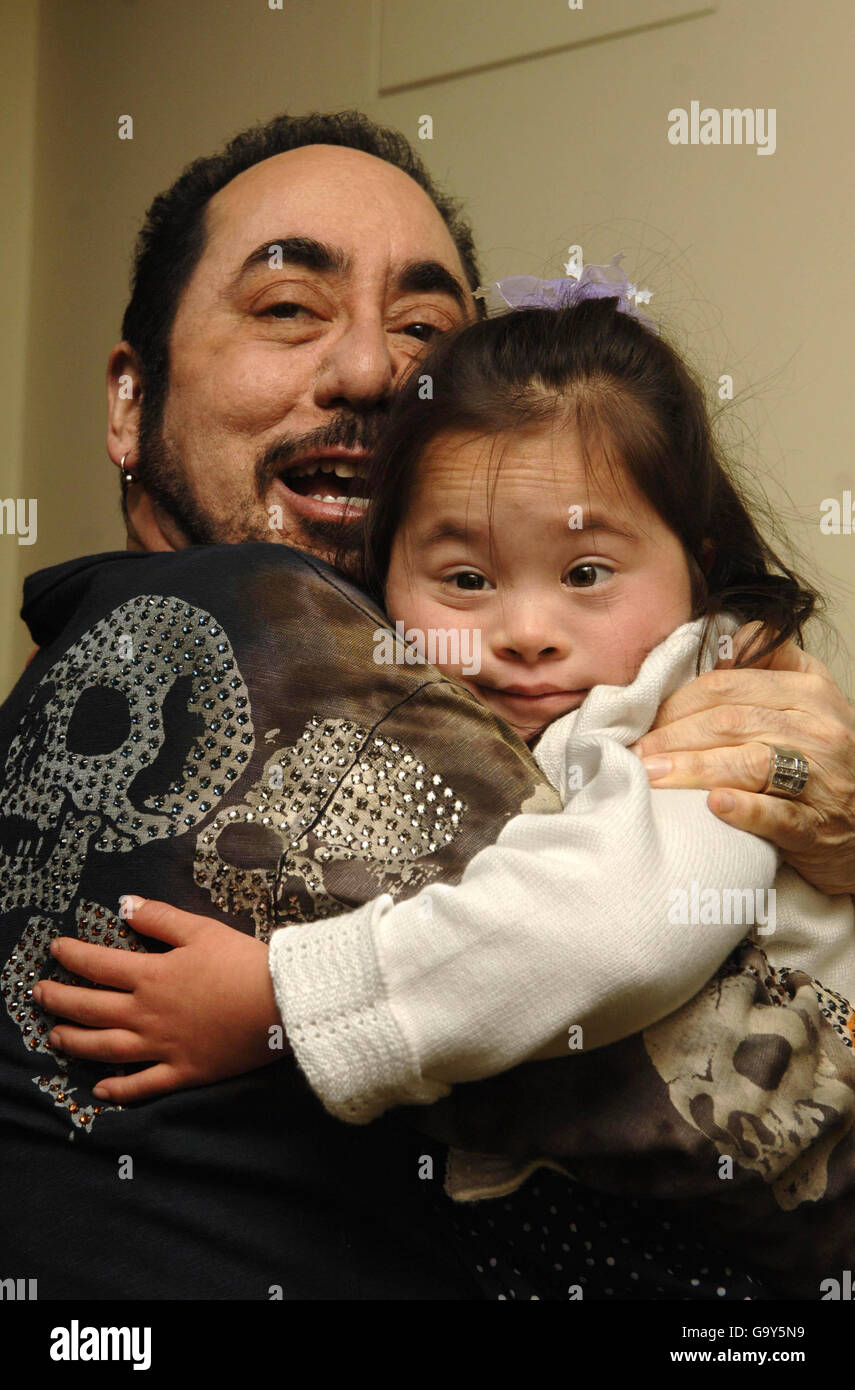 David Gest hugs Isabella Costello, 6, one of the children who will ...