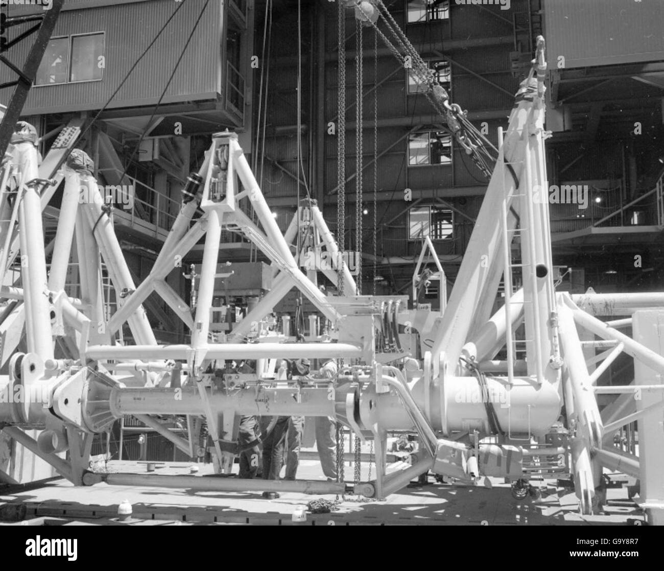 Image from the Atlas Negative Collection, depicting the raising of ...