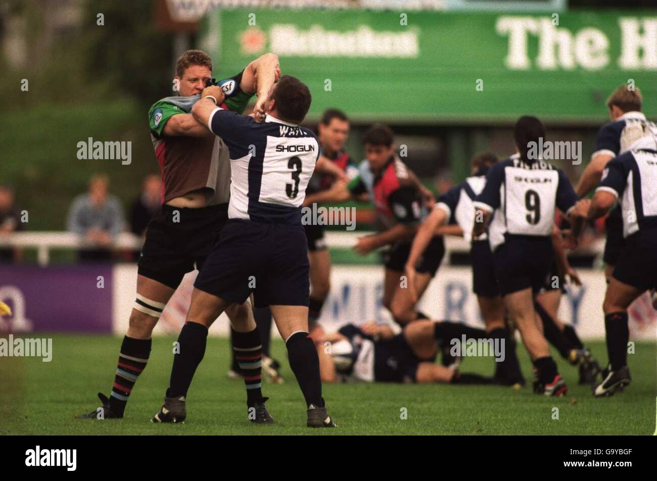 (L-R) NEC Harlequins' Garrick Morgan picks a fight with Bristol Shoguns ...