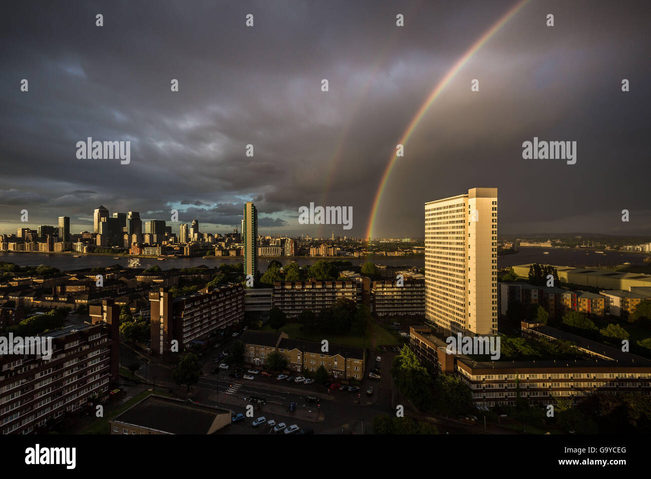 London, UK. 1st July, 2016. UK Weather: Colourful rainbow breaks during ...