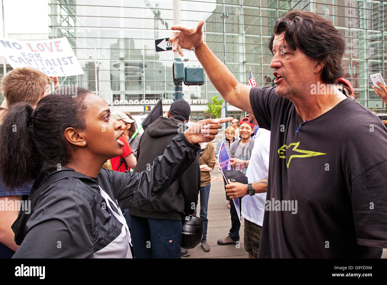 Denver, Colorado, USA. 1st July 2016. Supporter and opponent of ...