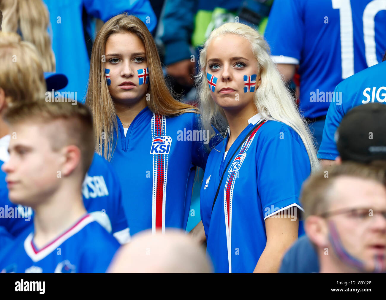 Paris, France. 3rd July, 2016. Fans and spectators with colorful face ...