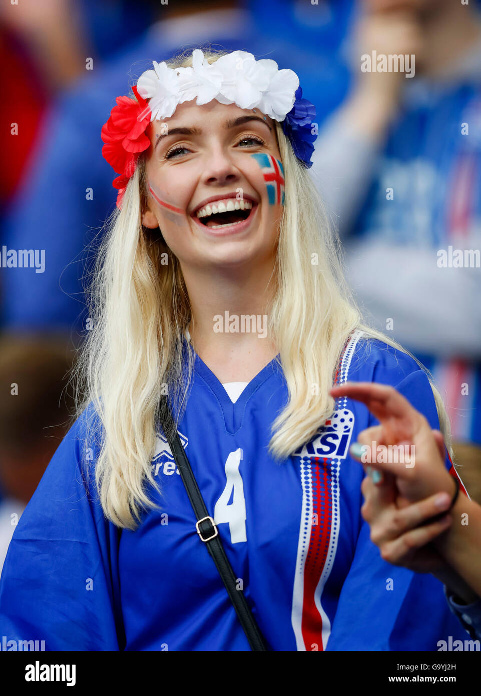 Paris, France. 3rd July, 2016. female Fans and spectators with colorful ...