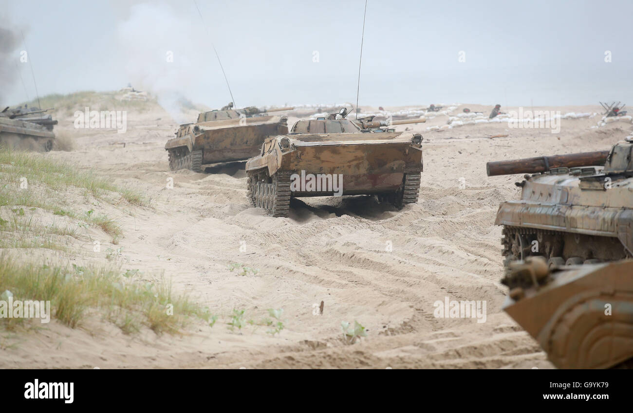 Ustka, Poland. 16th June, 2016. Polish tanks roll across a stretch of ...