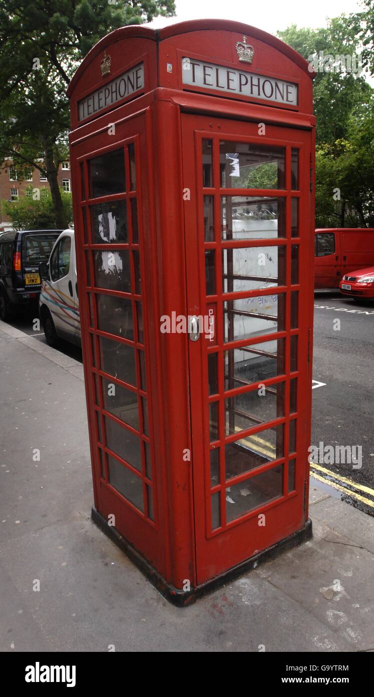 Quintessentially British. Red telephone box stands in Soho in central ...