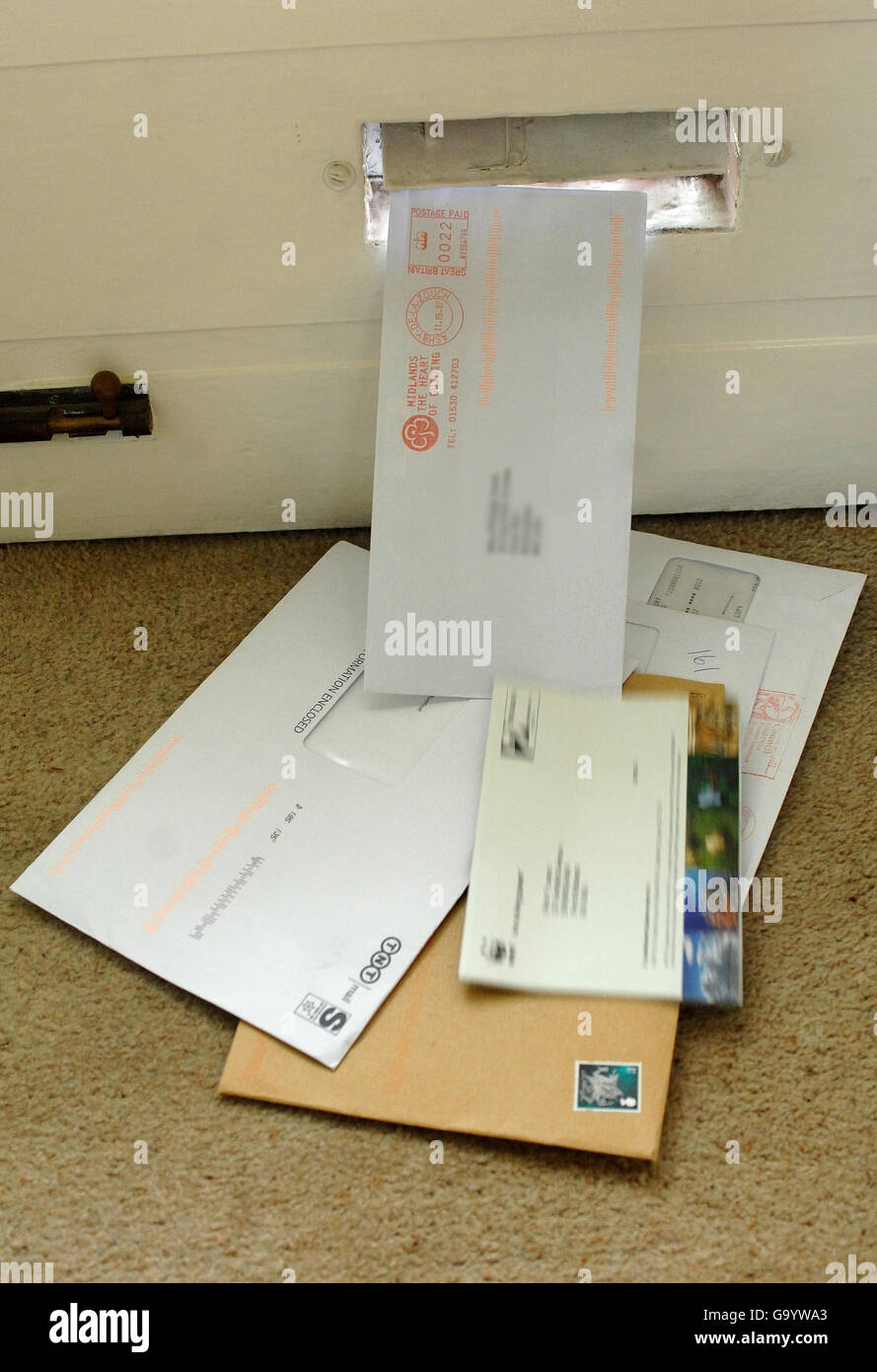 A generic image of post being delivered through a letterbox Stock Photo ...