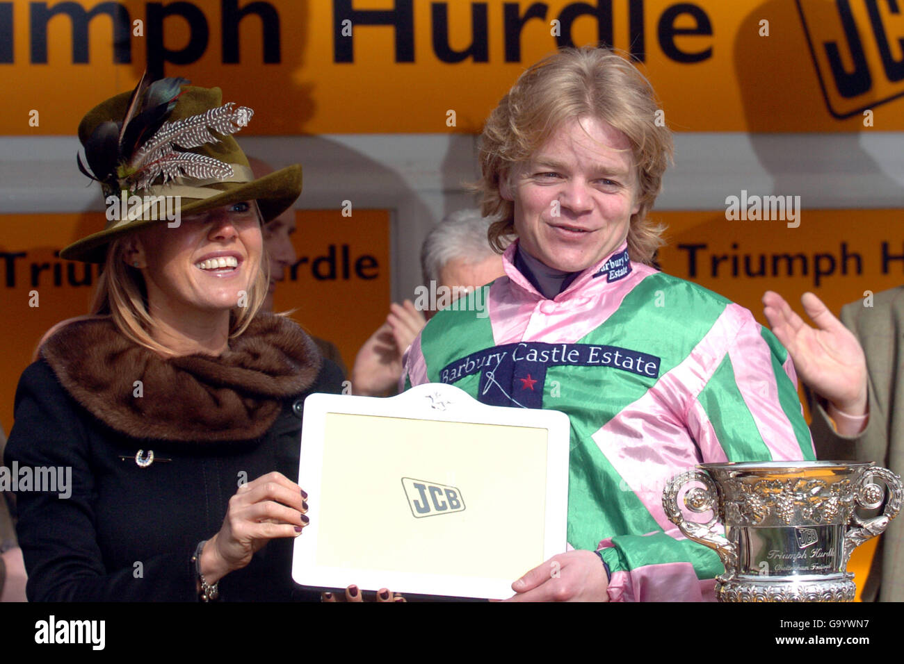 Jockey Robert Thornton (right) celebrates winning with Katchit in the ...