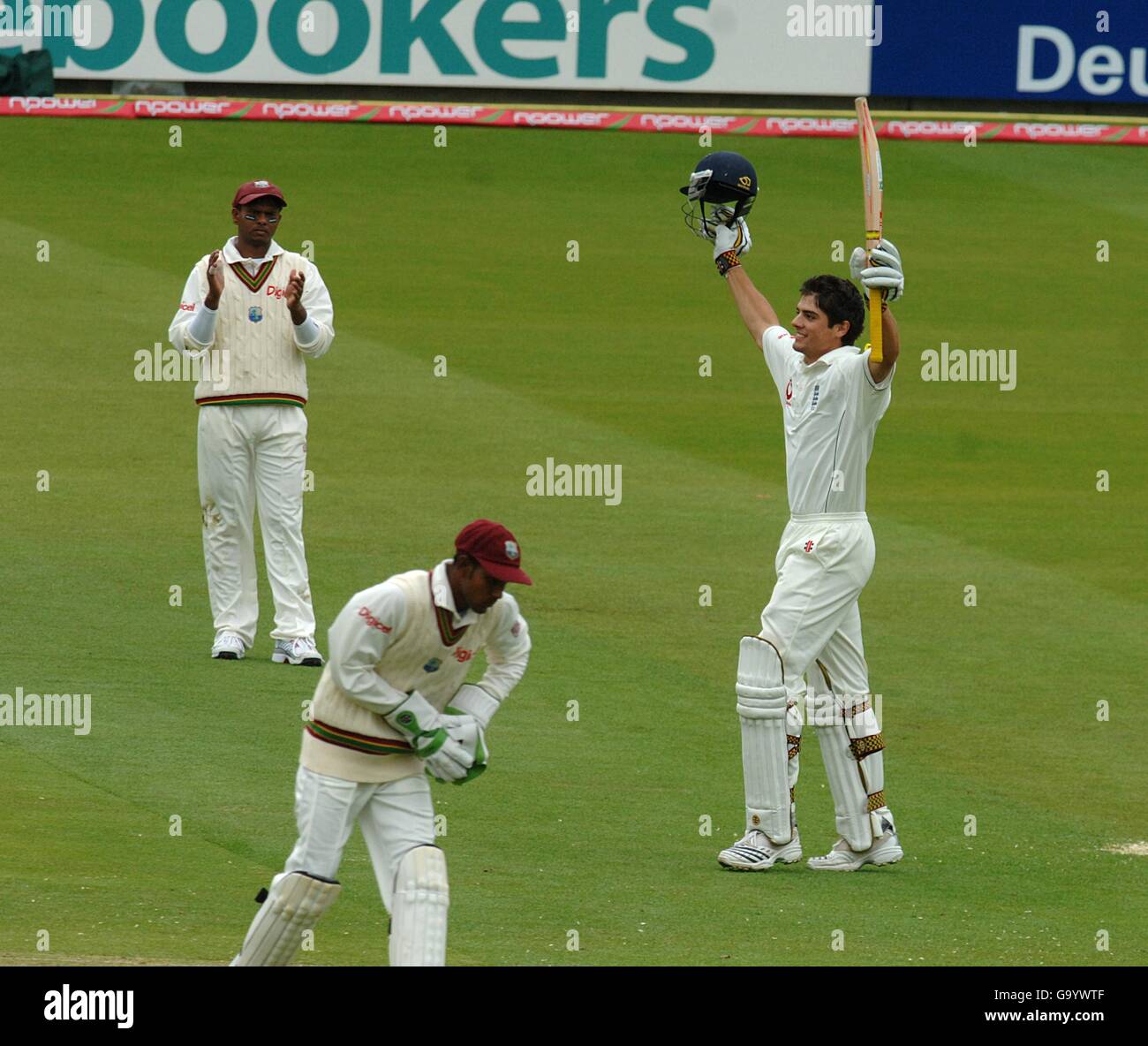 England's Alastair Cook (right) celebrates getting a century Stock ...