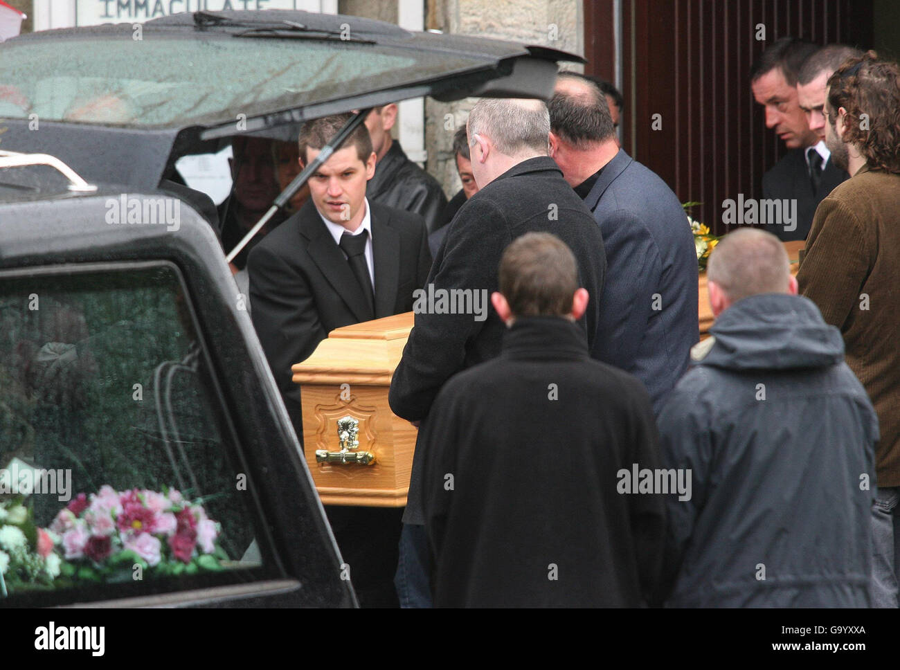 Mother and child buried Stock Photo - Alamy