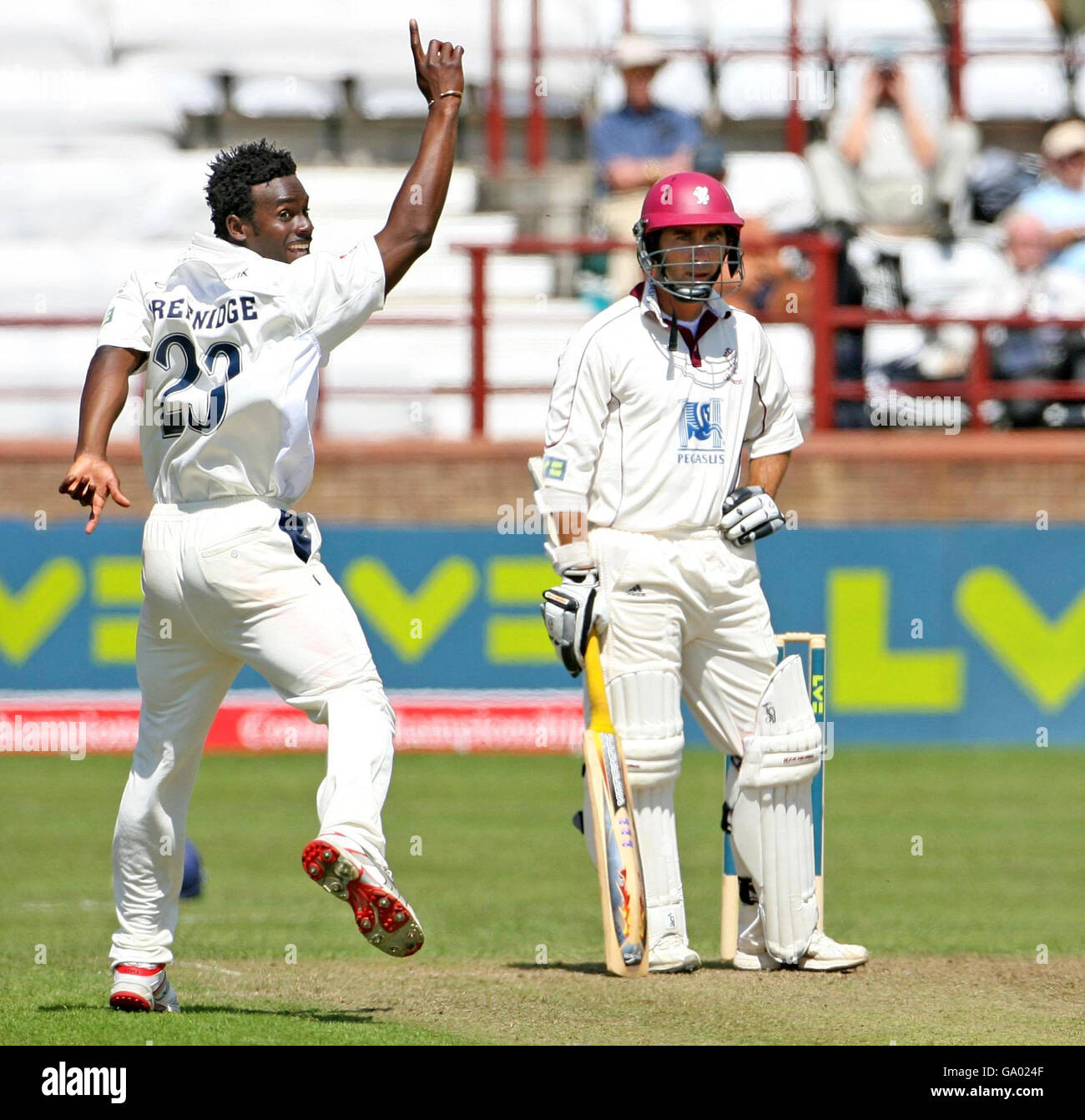 Somerset captain Justin Langer is caught behind by Steven Snell for 18 ...
