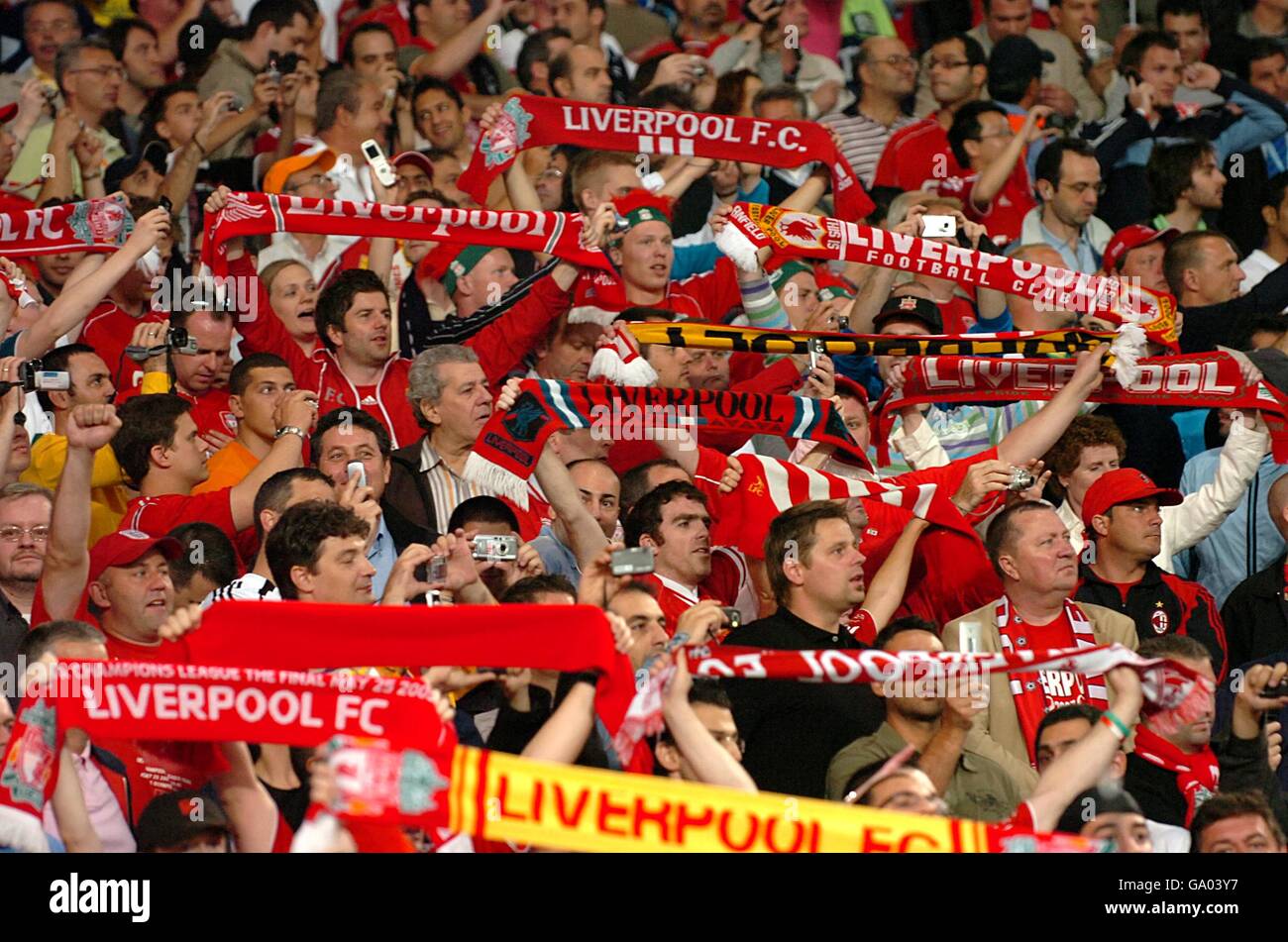 The liverpool fans cheer on their team hi-res stock photography and ...