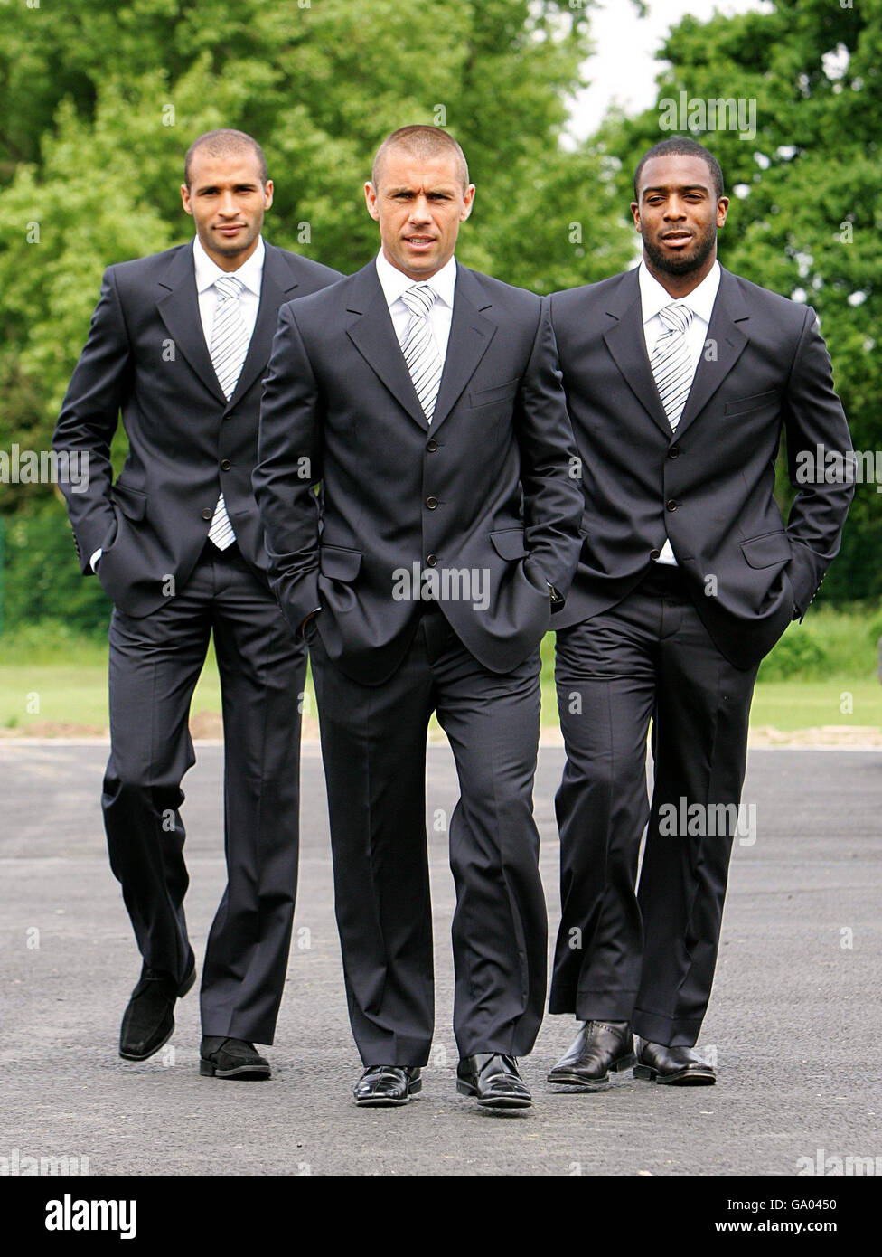 Full length eye contact arriving smiling england mangrk hi-res stock ...