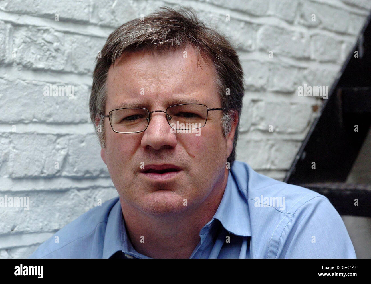 Angus MacKinnon in the garden of his home in Islington, north London ...