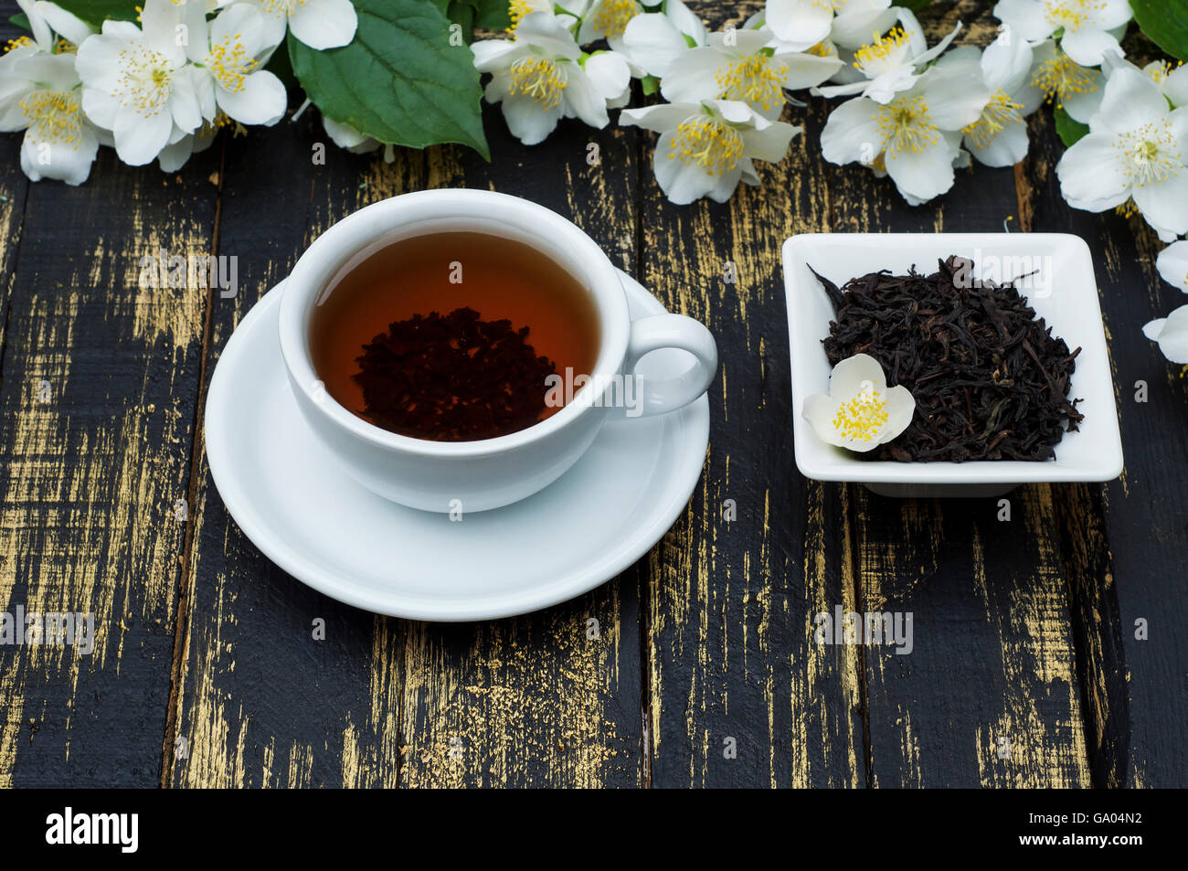 Jasmine tea with jasmine flower on table background Stock Photo - Alamy