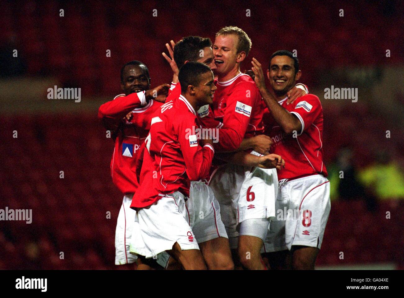 Nottingham Forest's Chris Doig (Hidden) is congratulated by his team ...