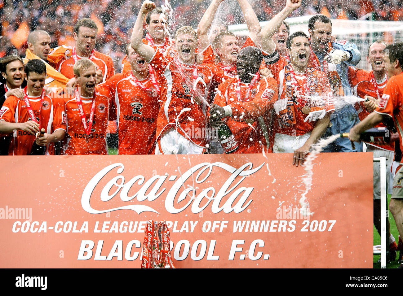 Blackpool players celebrate their sides promotion to the Coca Cola ...