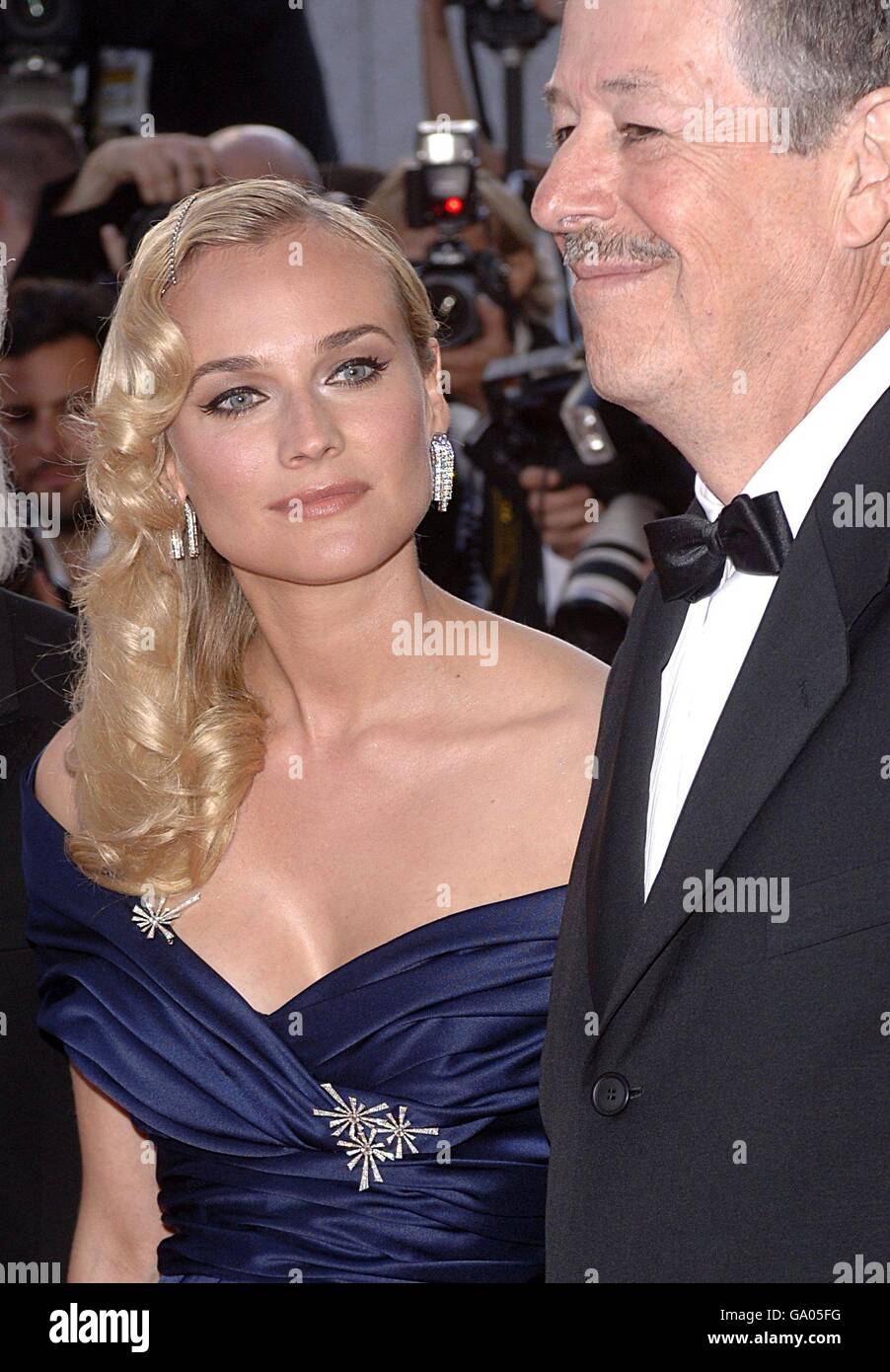 Diane Kruger and Denys Arcand arrive for the closing ceremony during ...