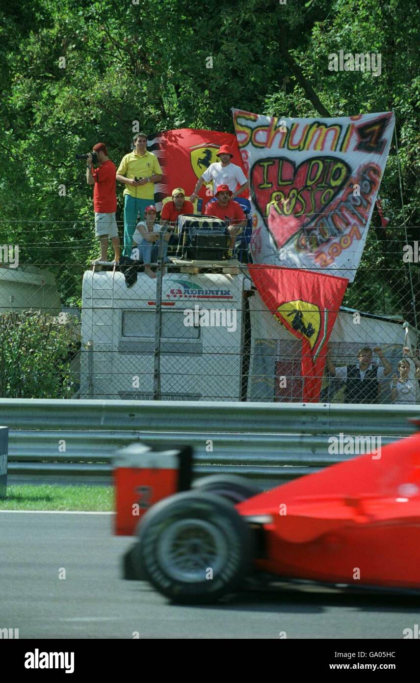 Formula One Motor Racing - Italian Grand Prix. Ferrari fans watch a ...