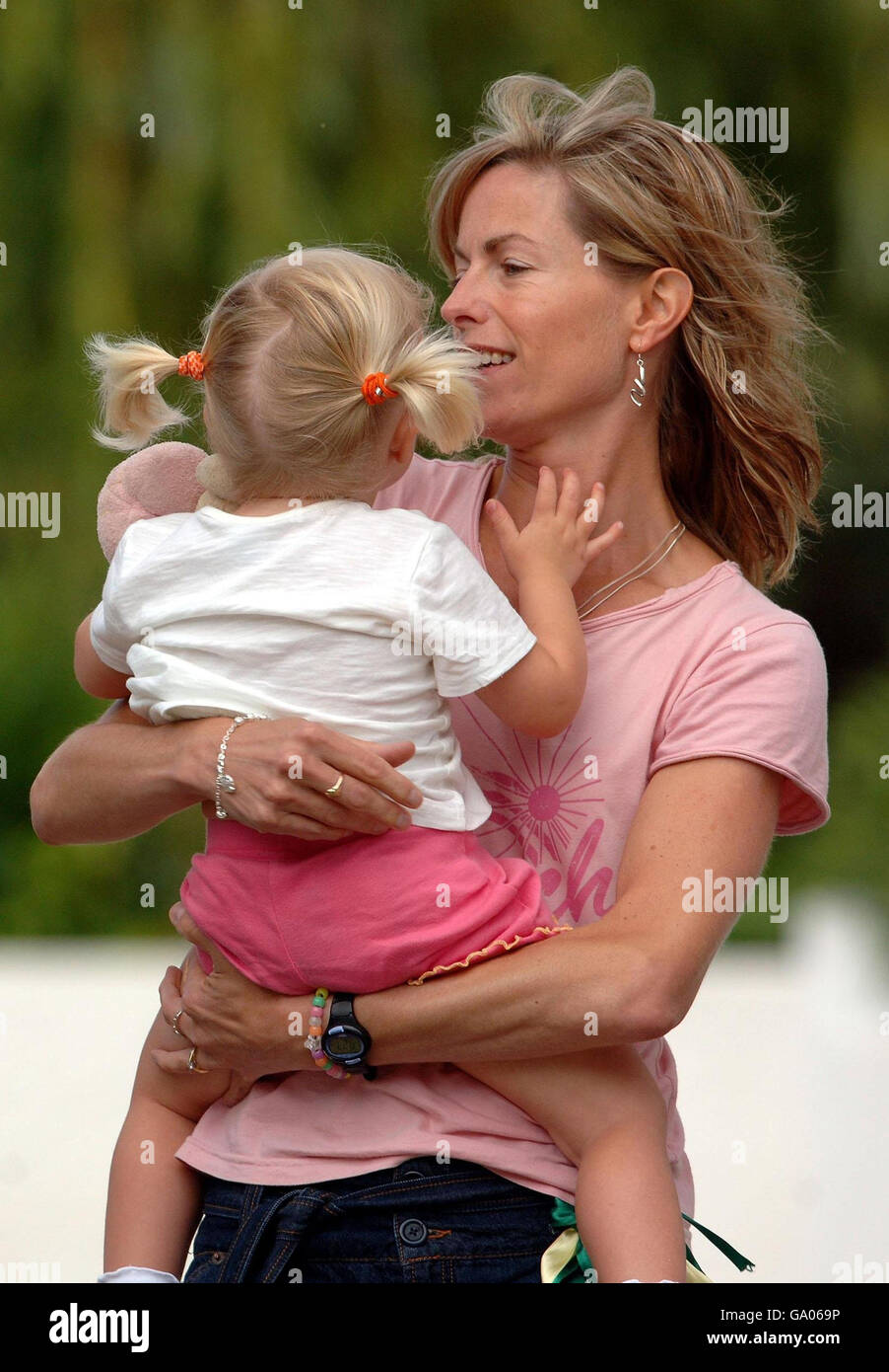 Kate McCann plays with daughter Amelie as she and husband Gerry take ...