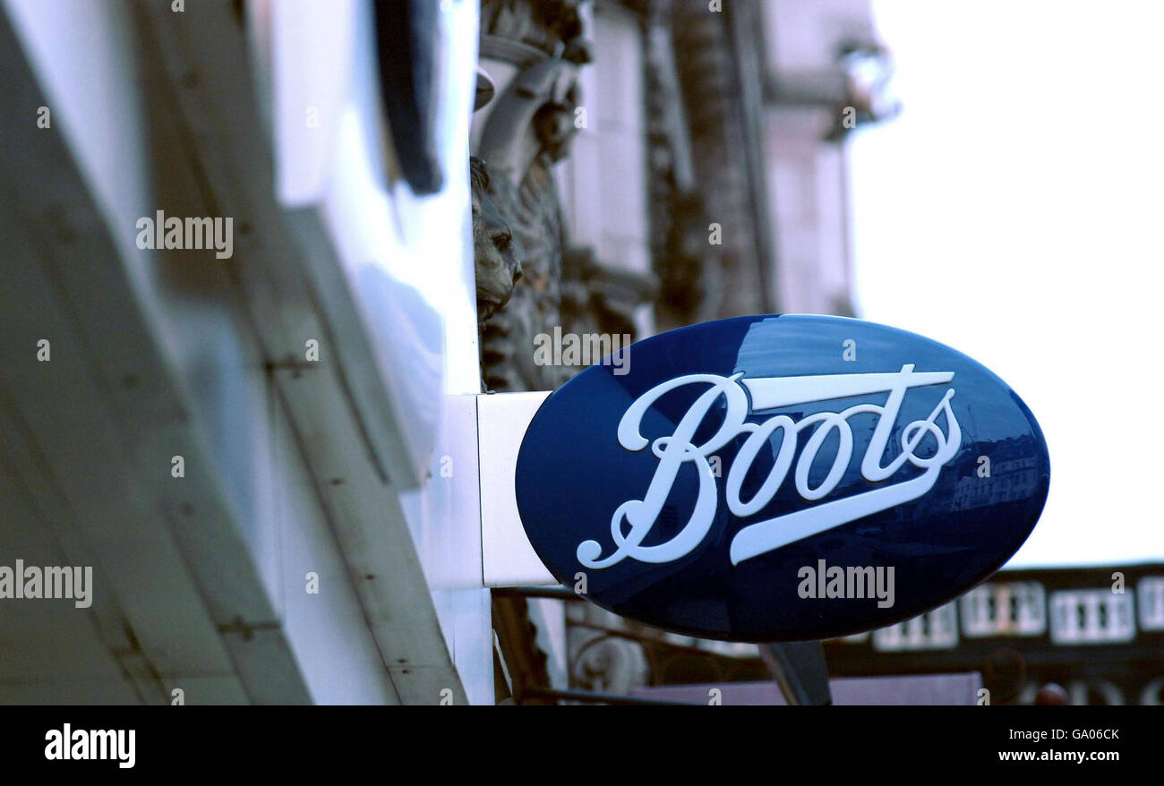 Detail view of the sign outside high street chemist Boots, on the ...